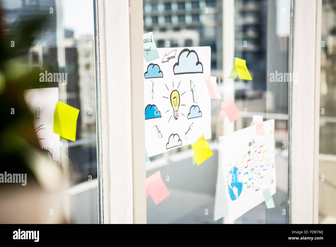 Adhesive notes on window Stock Photo - Alamy