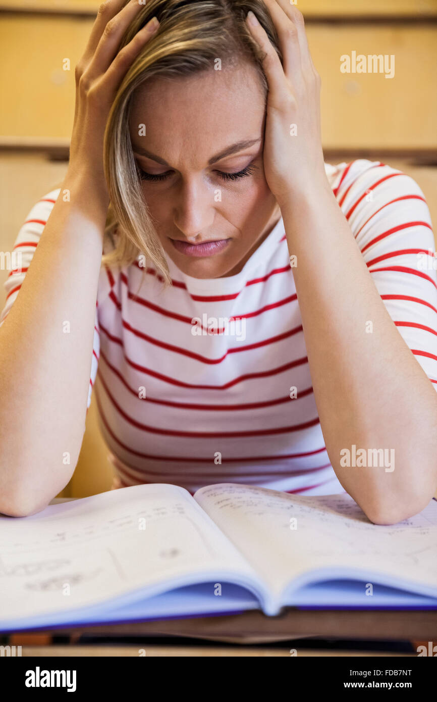Busy female student studying Stock Photo - Alamy