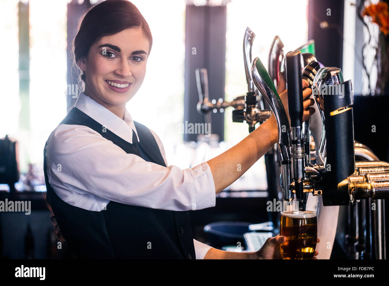 Happy woman barmaid cafe hi-res stock photography and images - Alamy