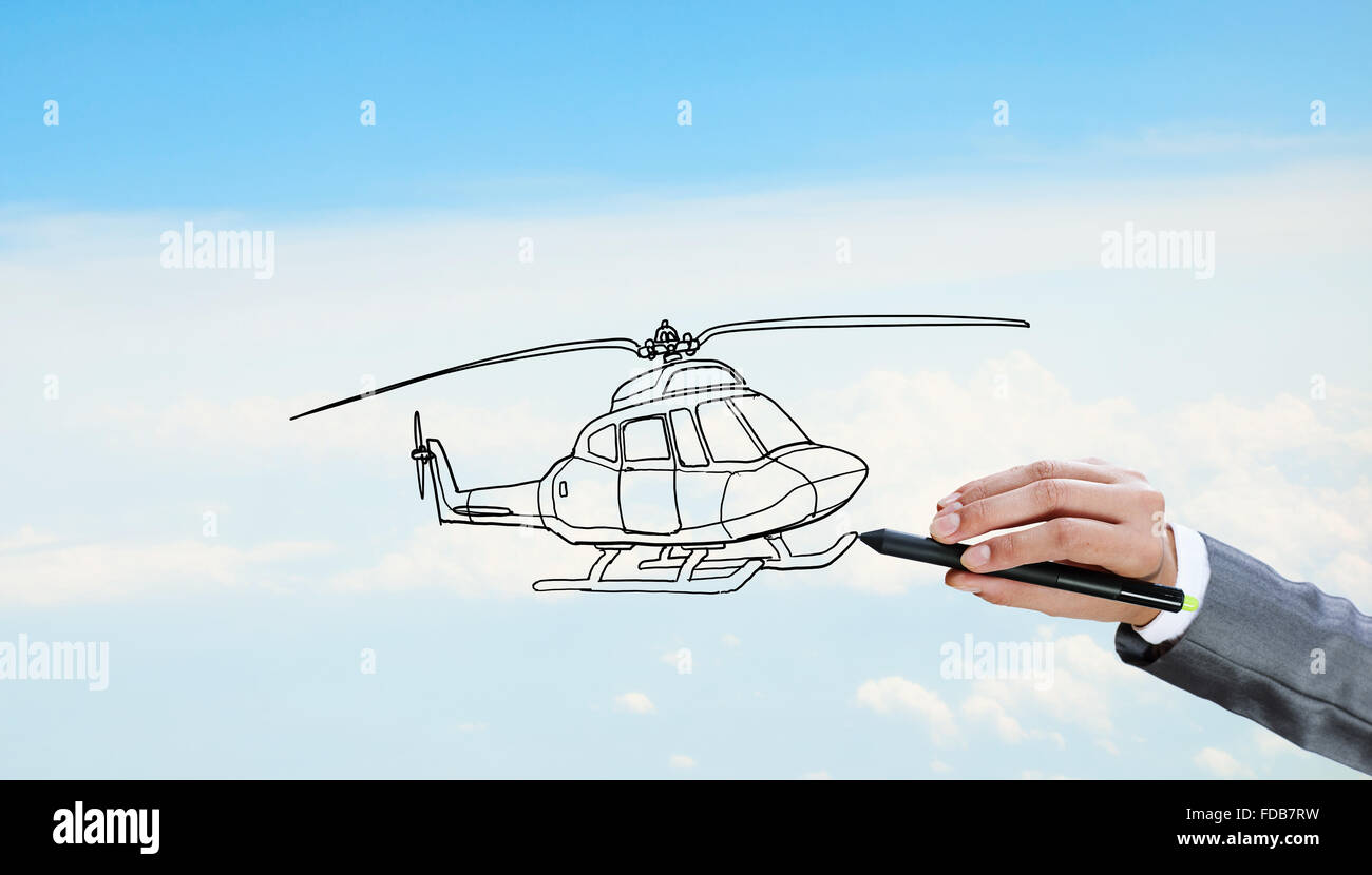 Hand drawing with stylus helicopter model on sky background Stock Photo ...