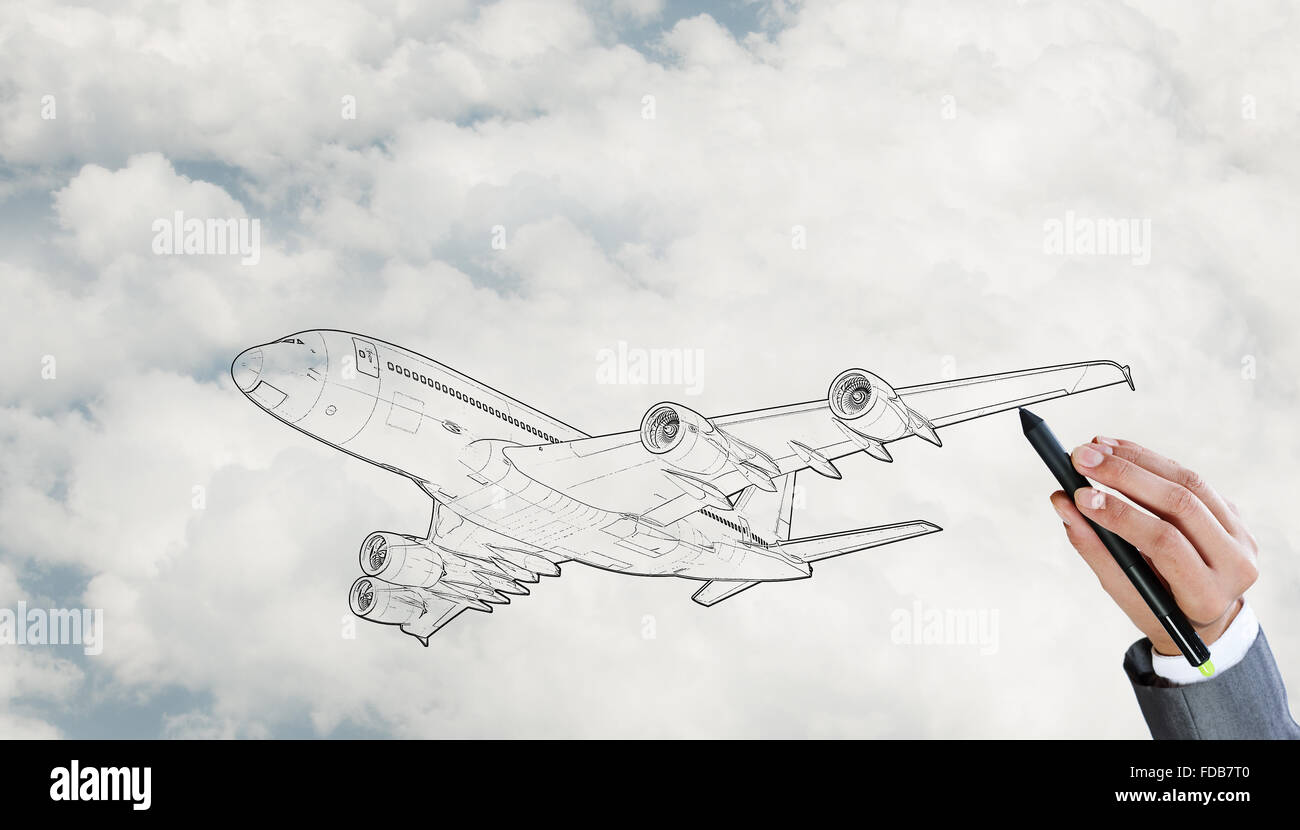 Person drawing airplane model on sky background Stock Photo - Alamy