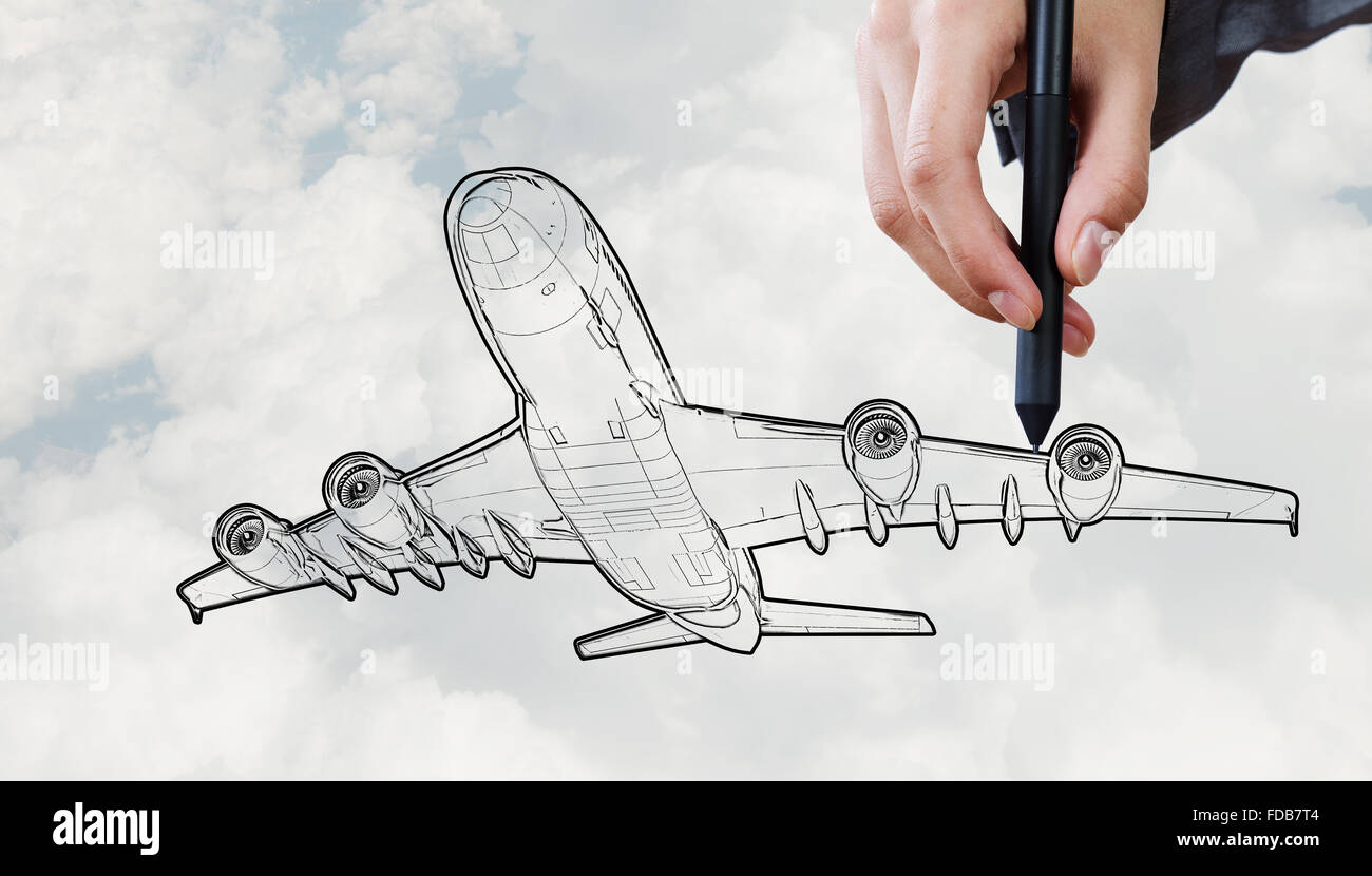 Person drawing airplane model on sky background Stock Photo - Alamy