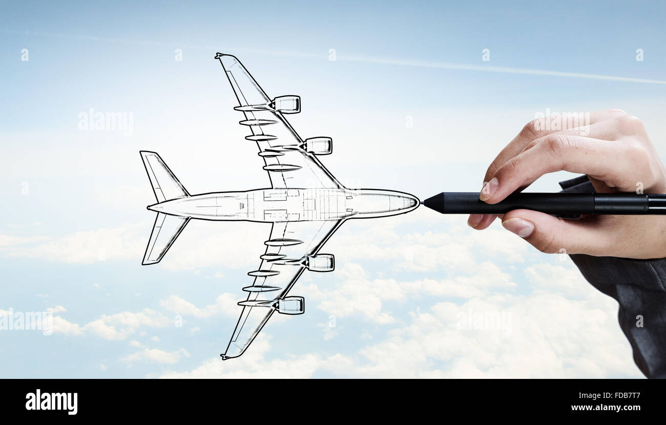 Person drawing airplane model on sky background Stock Photo - Alamy