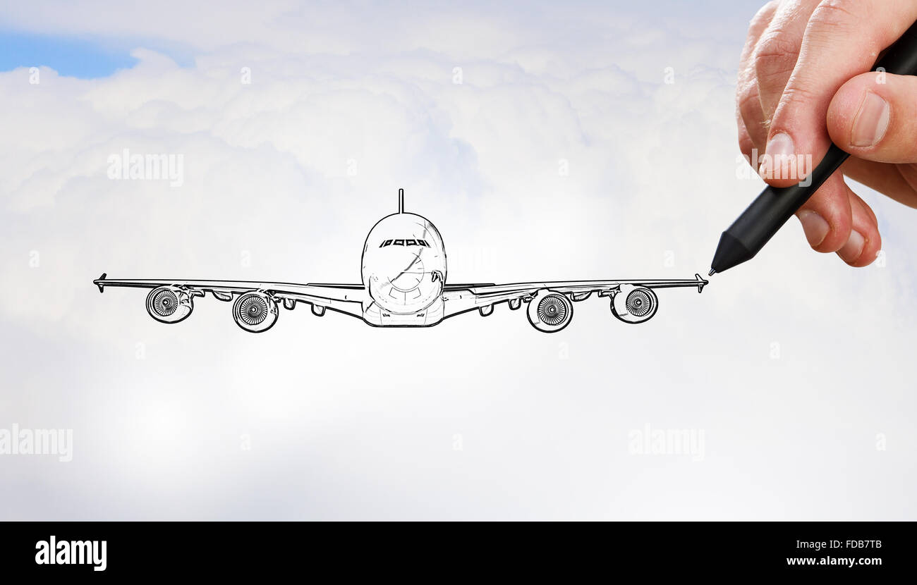Person drawing airplane model on sky background Stock Photo - Alamy
