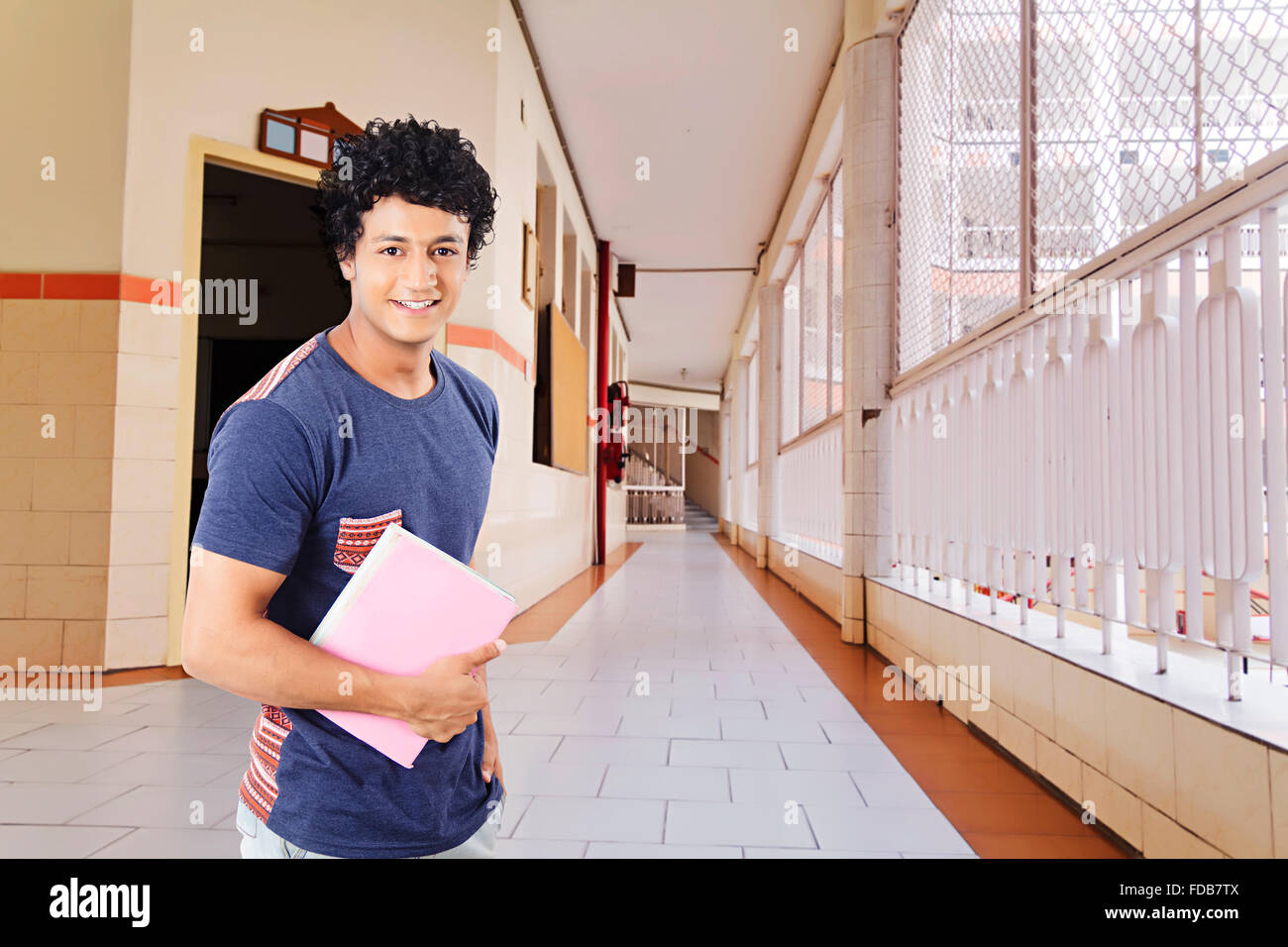 1 Teenager boy College Student Campus Corridor Standing Stock Photo - Alamy