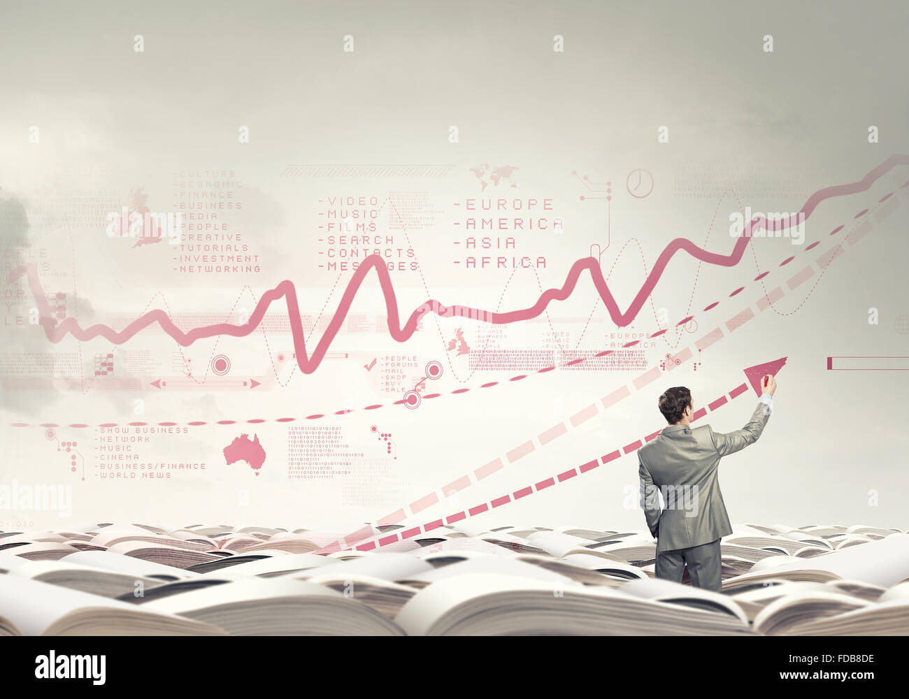 Back view of businessman drawing increasing graph on wall Stock Photo ...