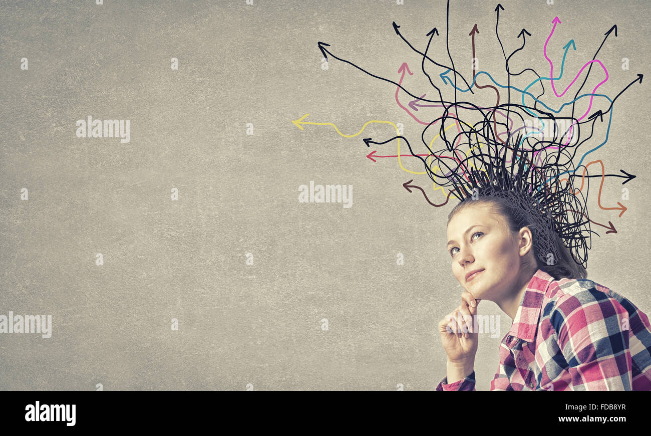 Pretty young woman making decision with arrows above her head Stock ...