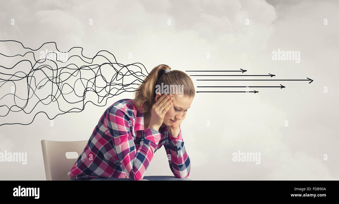 Pretty young woman making decision with arrows above her head Stock ...