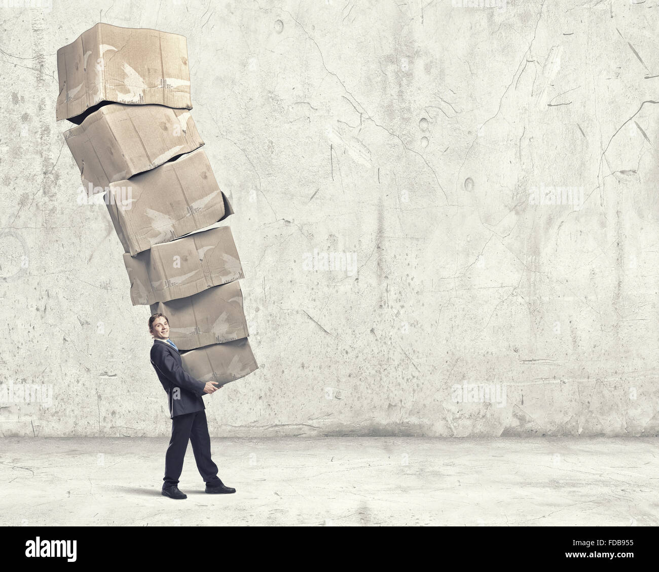 Businessman carrying big stack of carton boxes Stock Photo - Alamy
