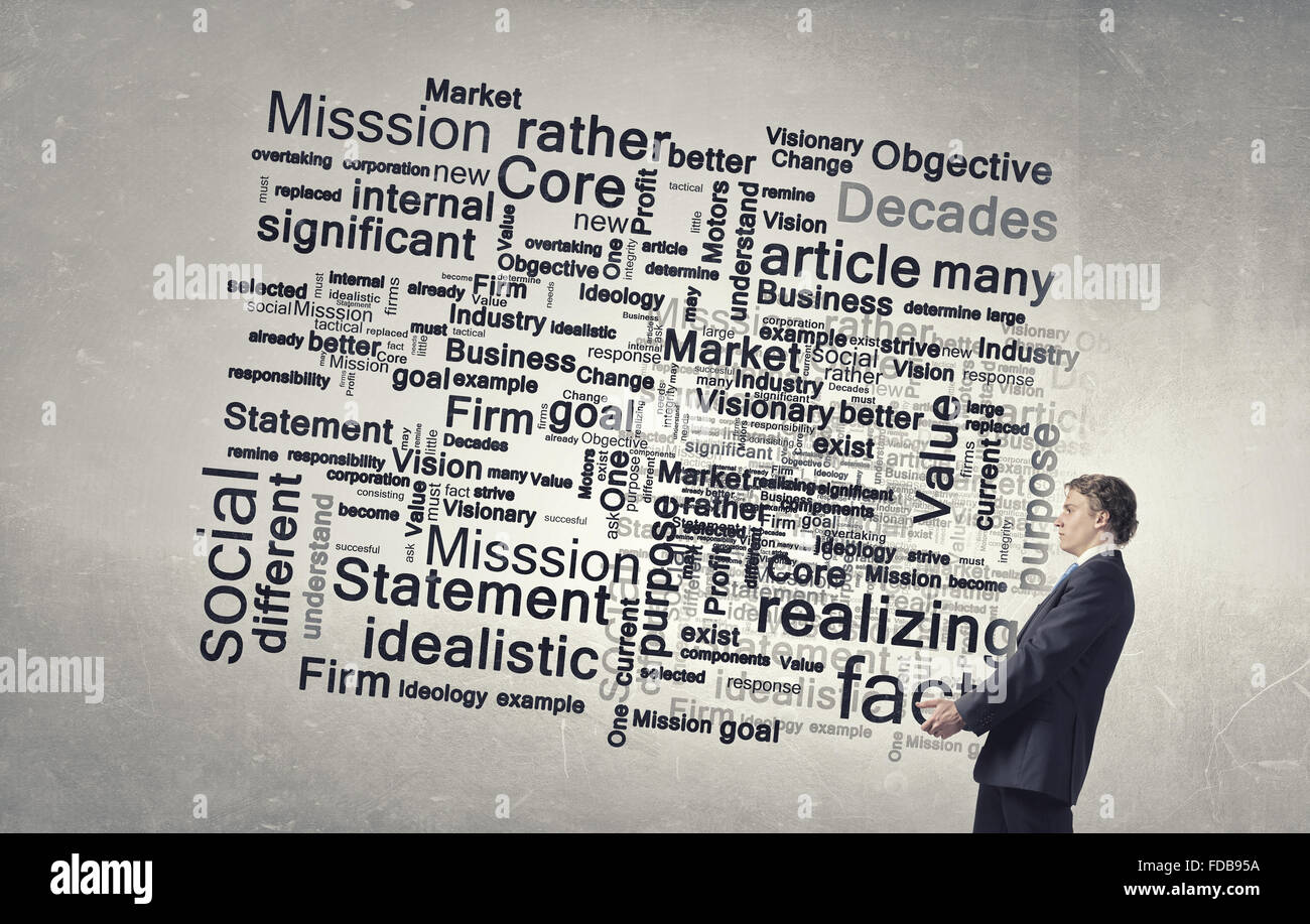 Young businessman carrying in hands business idea concept Stock Photo ...