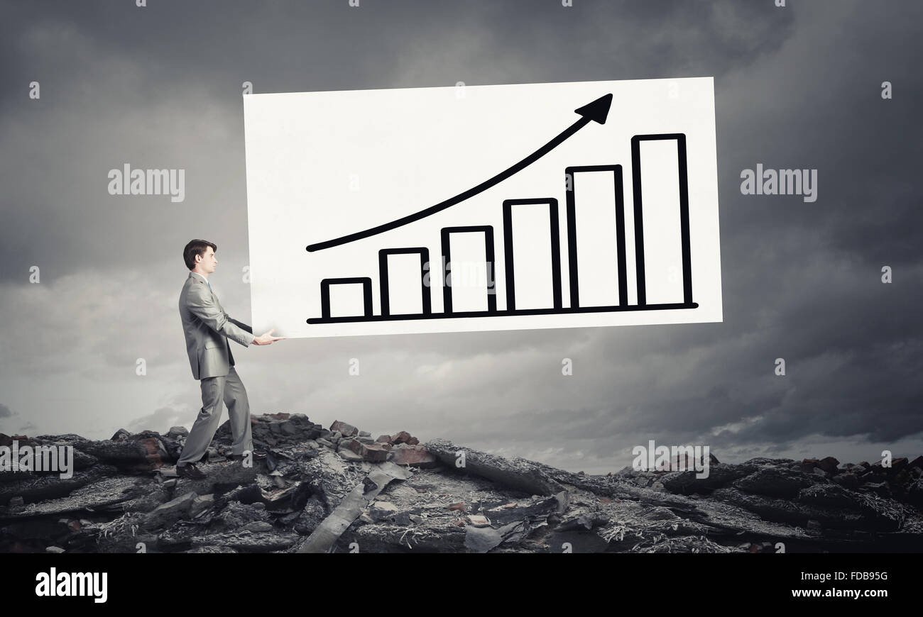 Businessman carrying white banner with graph growth concept Stock Photo ...
