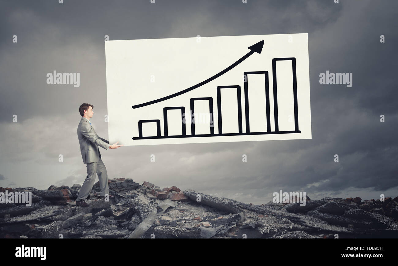 Businessman carrying white banner with graph growth concept Stock Photo ...