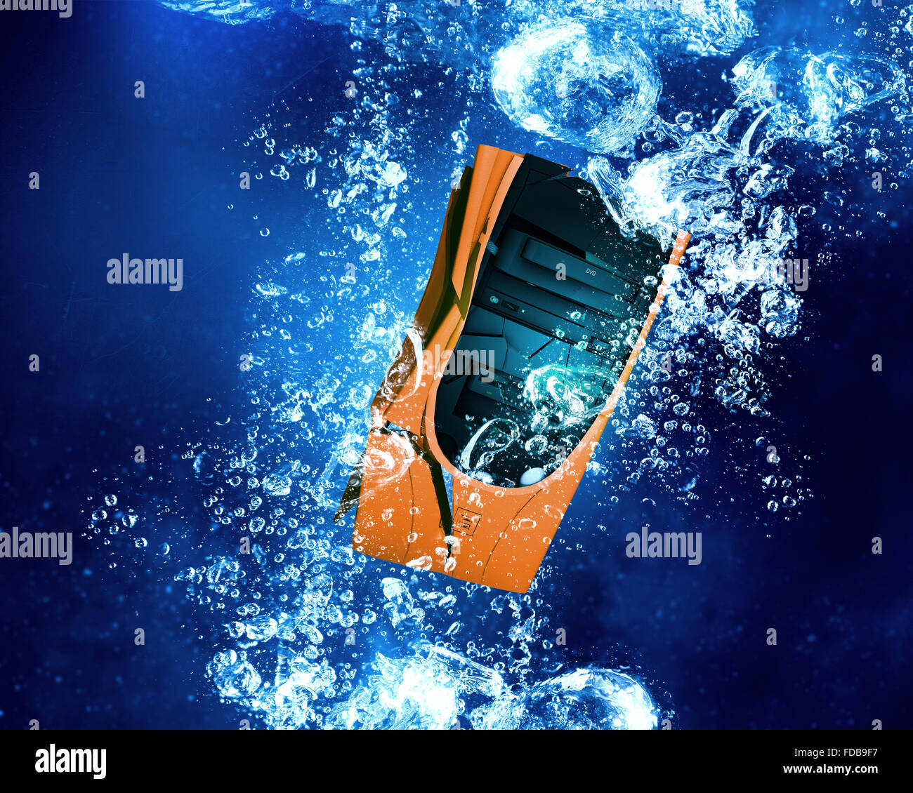Computer sinking and dissolving in clear blue water Stock Photo - Alamy