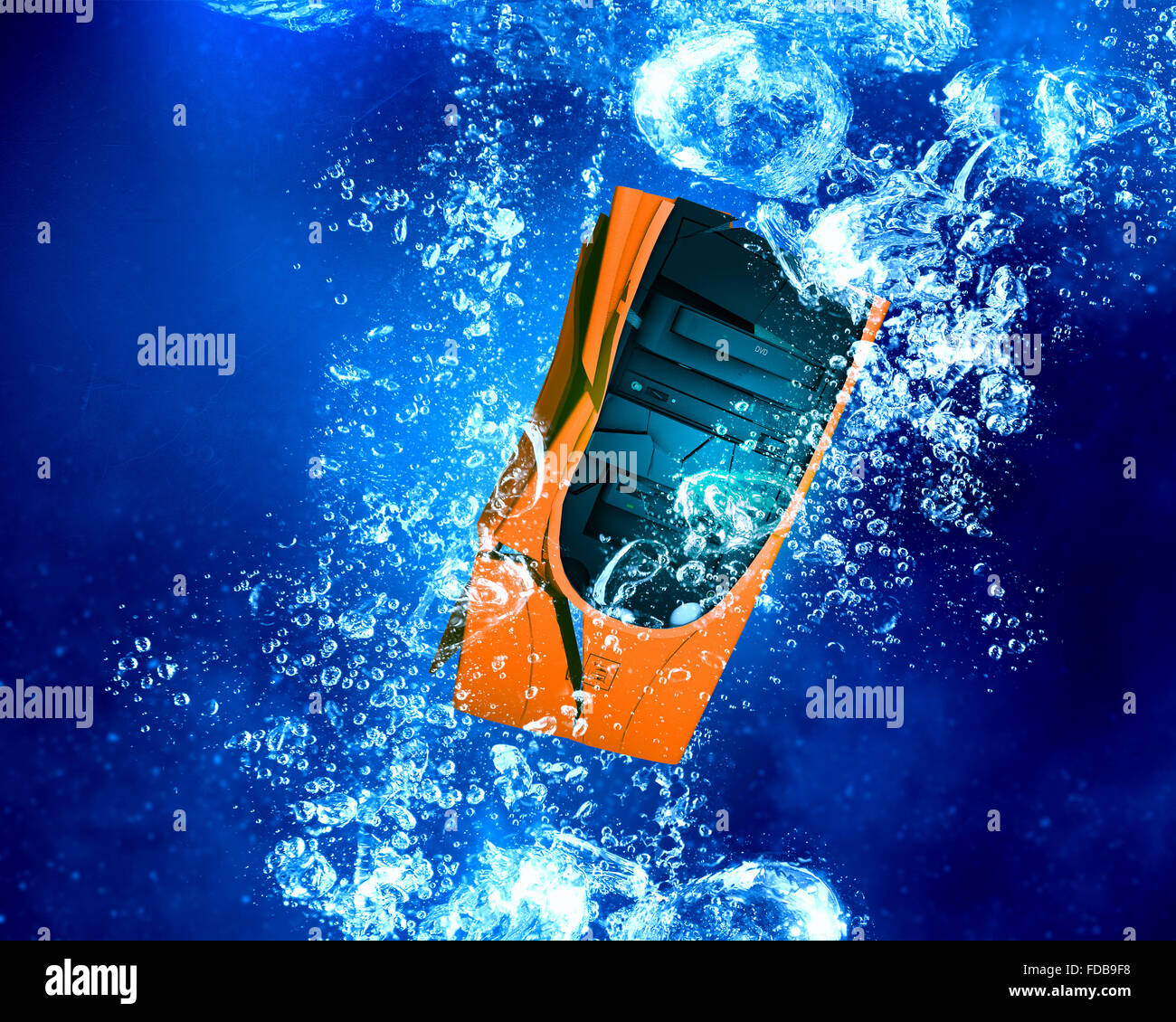Computer sinking and dissolving in clear blue water Stock Photo - Alamy