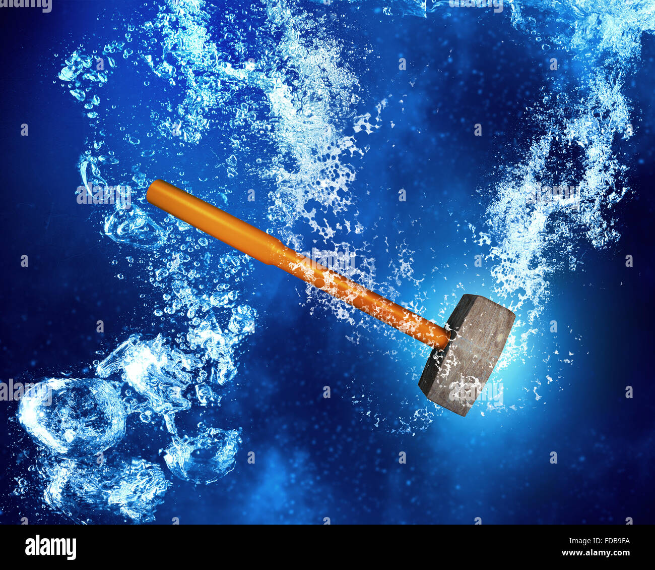 Hammer instrument sinking in clear blue water Stock Photo - Alamy