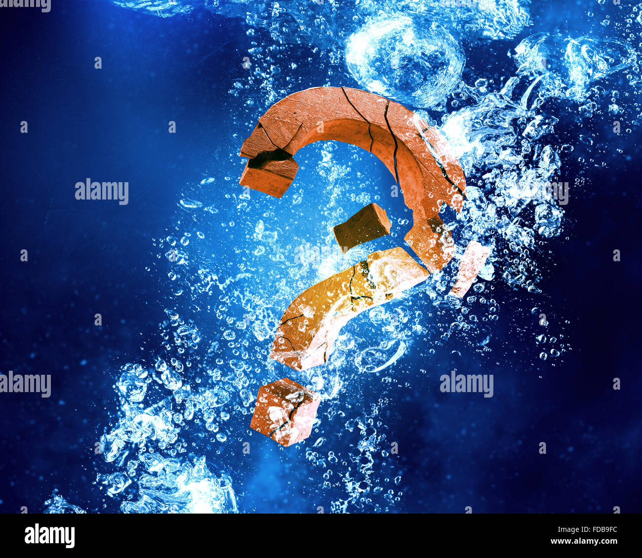 Question mark sink in clear blue water Stock Photo - Alamy