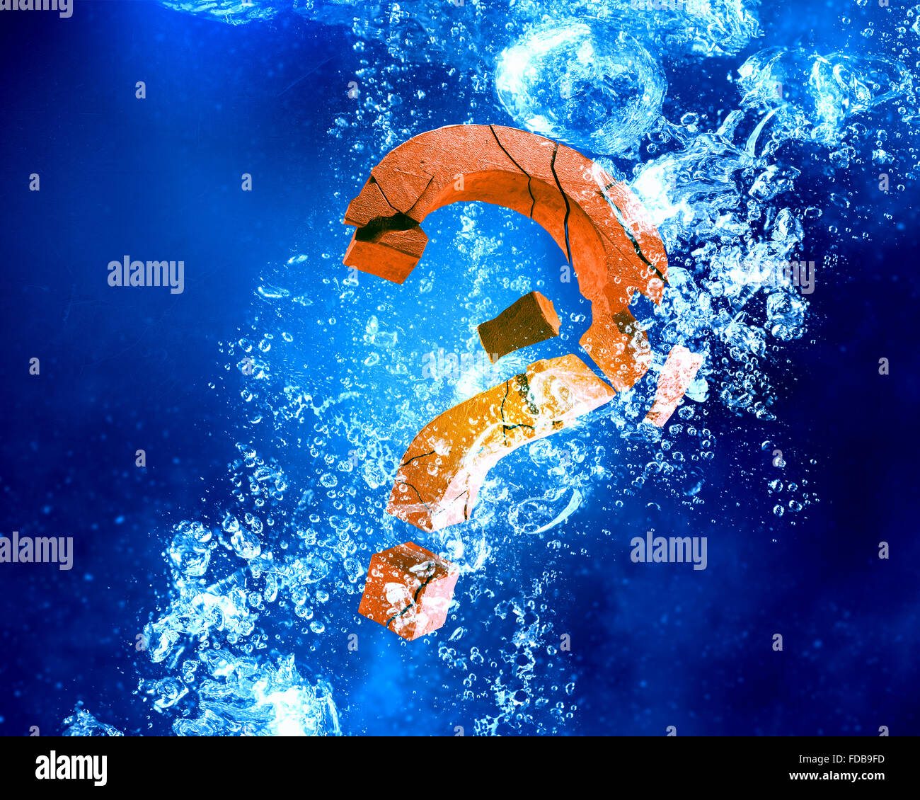 Question mark sink in clear blue water Stock Photo - Alamy
