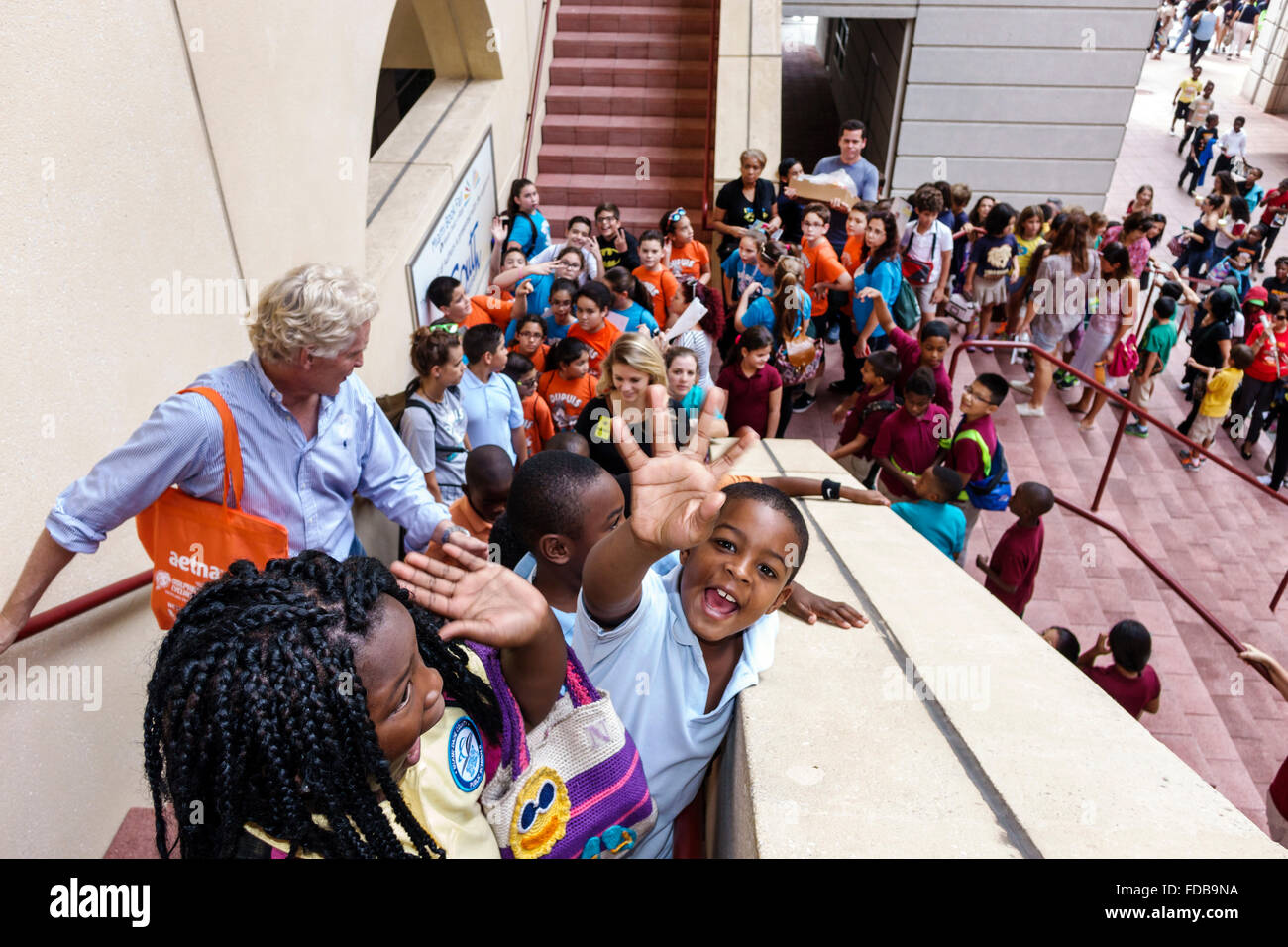 Students waving to each other on campus hi-res stock photography and ...