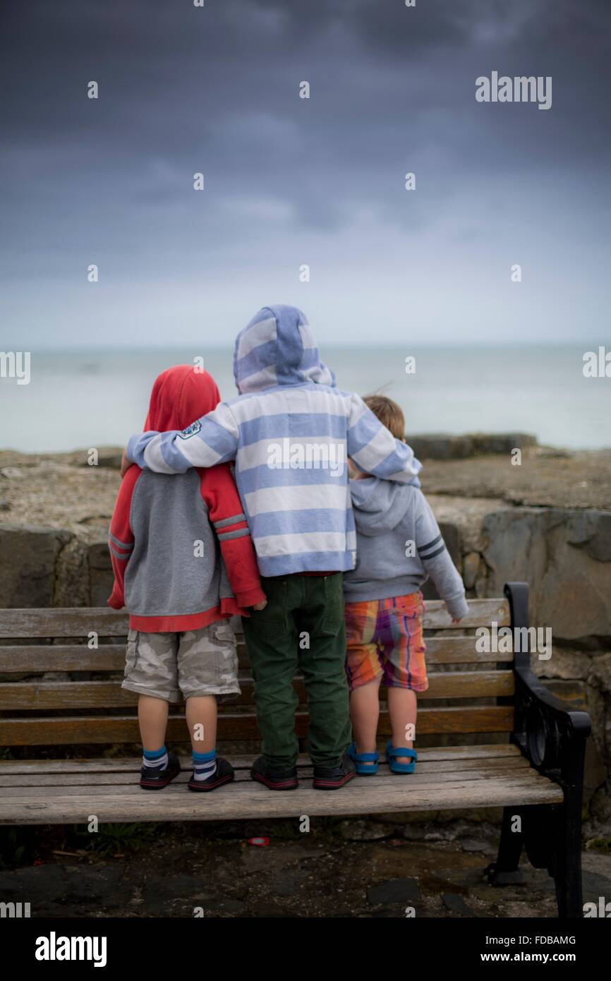 Boys on the bench hi-res stock photography and images - Alamy
