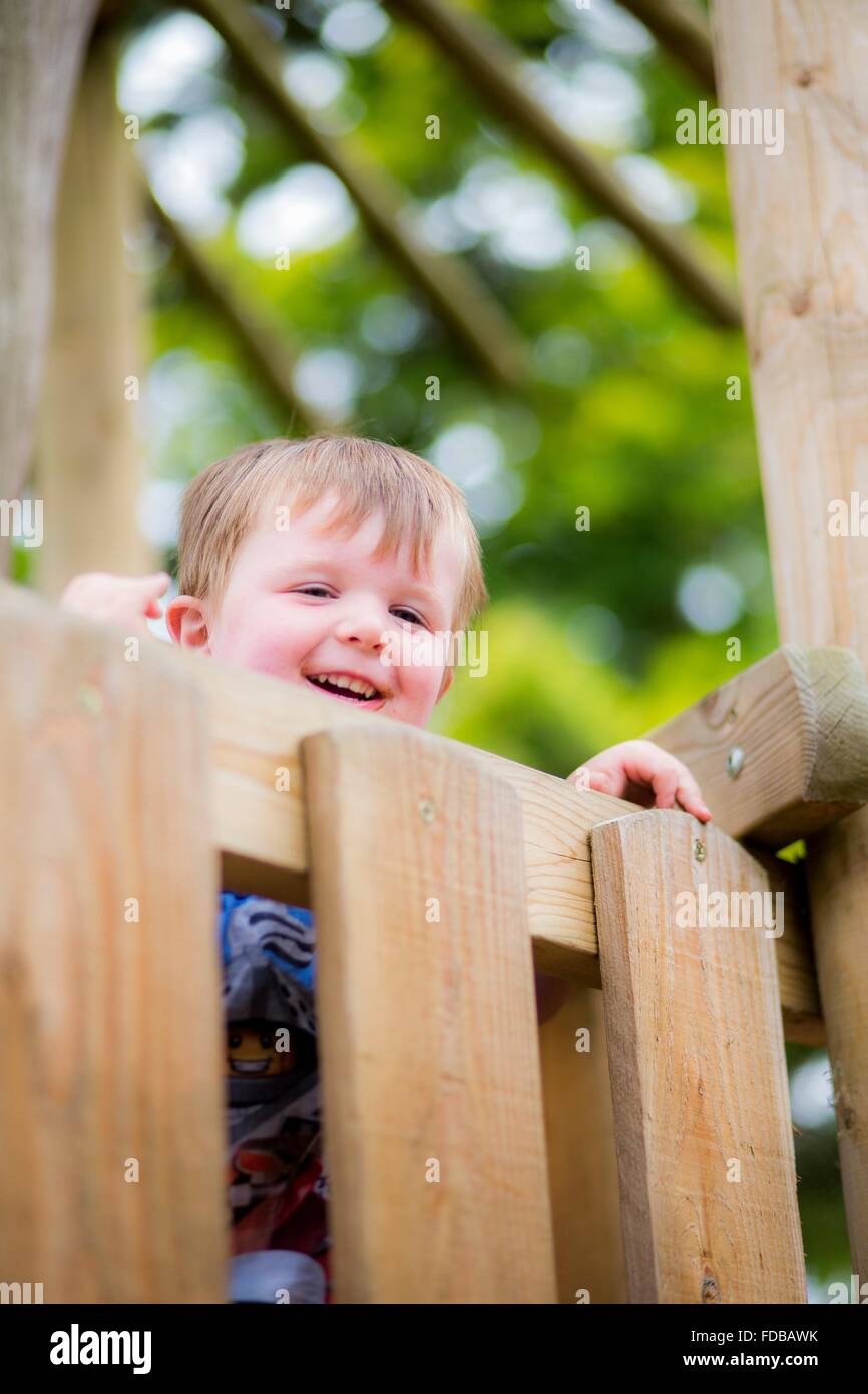 Peeking over fence hi-res stock photography and images - Alamy