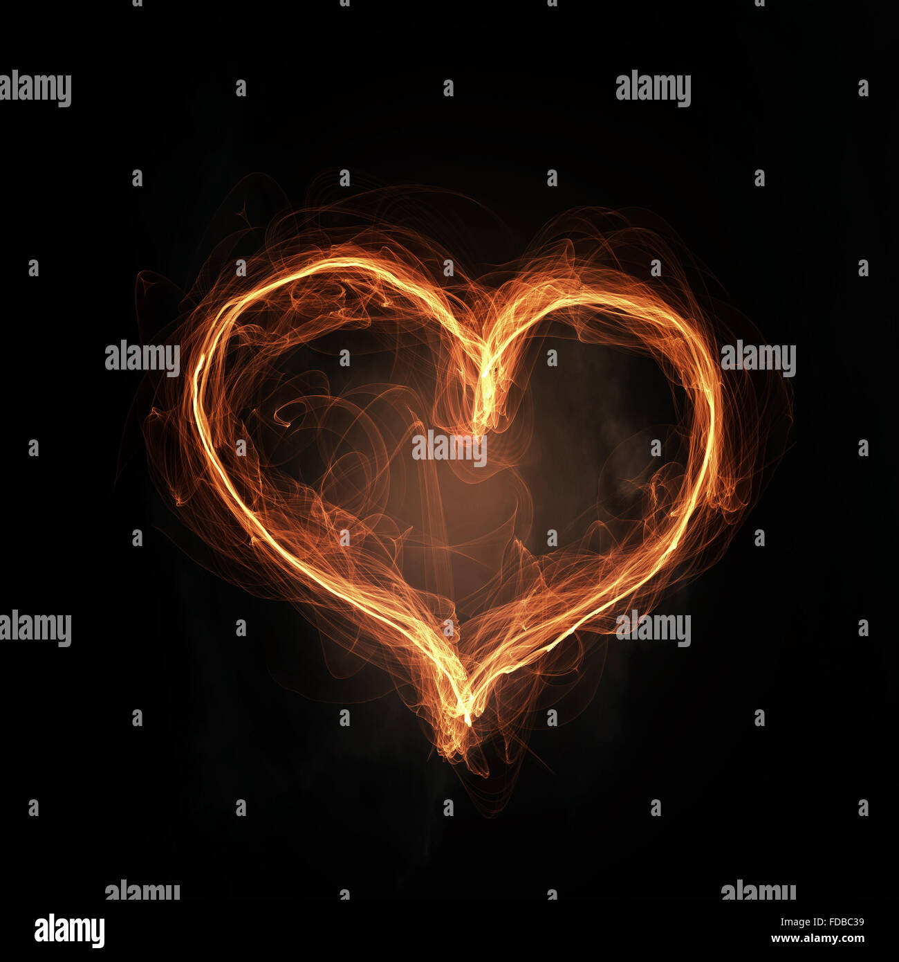 Glowing love heart symbol on dark background Stock Photo - Alamy Glowing love heart symbol on dark background Stock Photo - Alamy