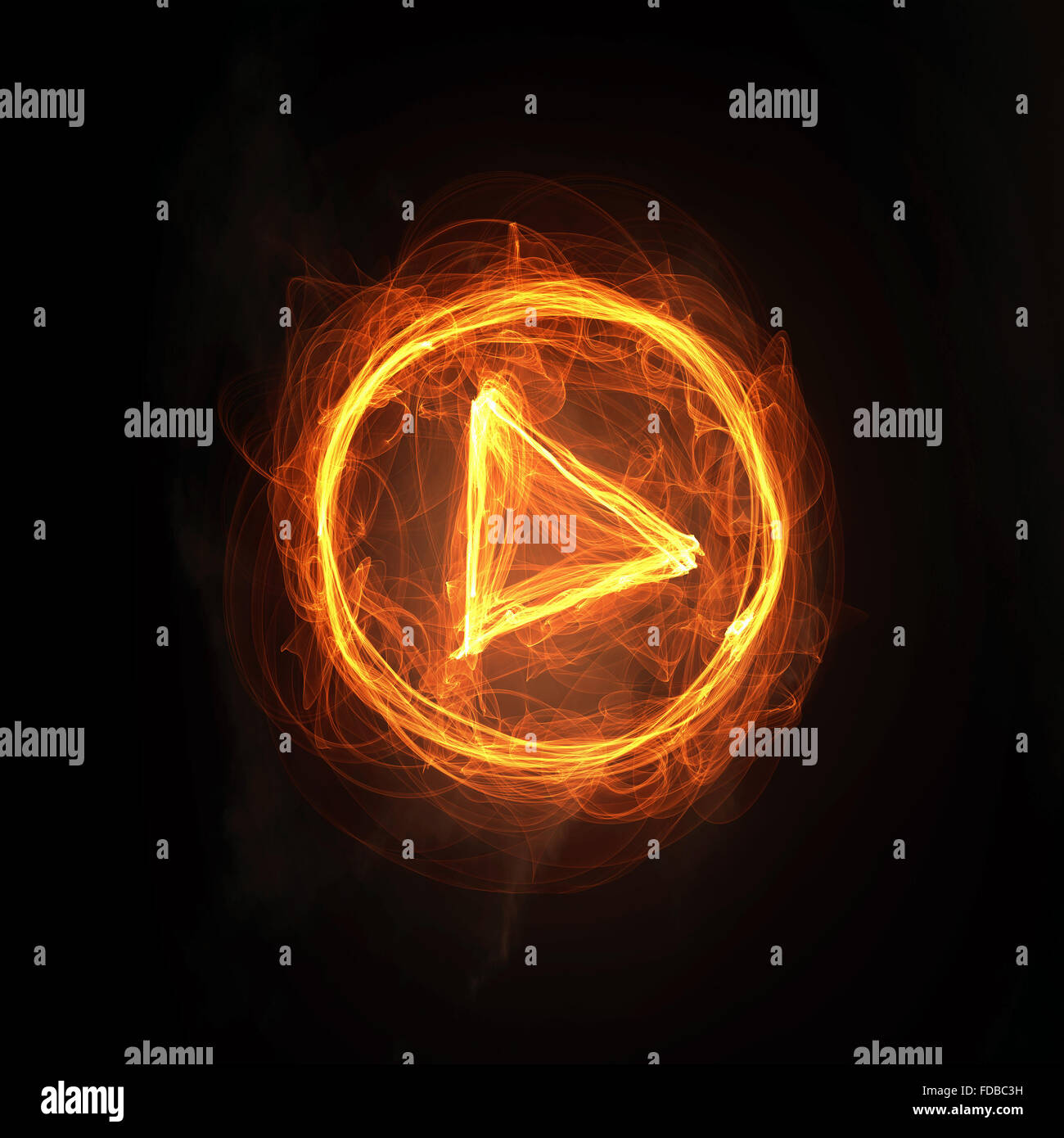 Glowing fire play icon on dark background Stock Photo - Alamy