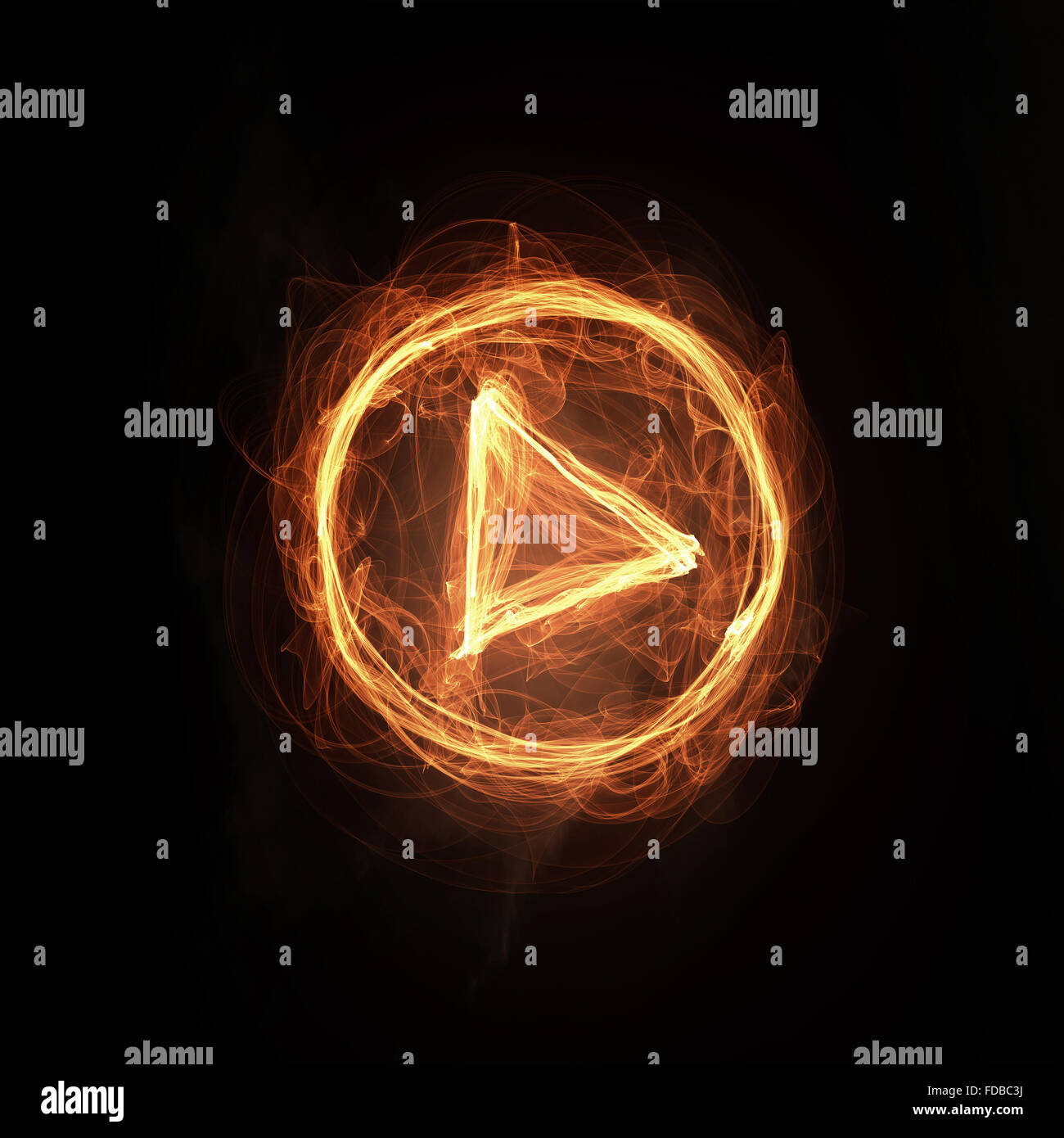 Glowing fire play icon on dark background Stock Photo - Alamy
