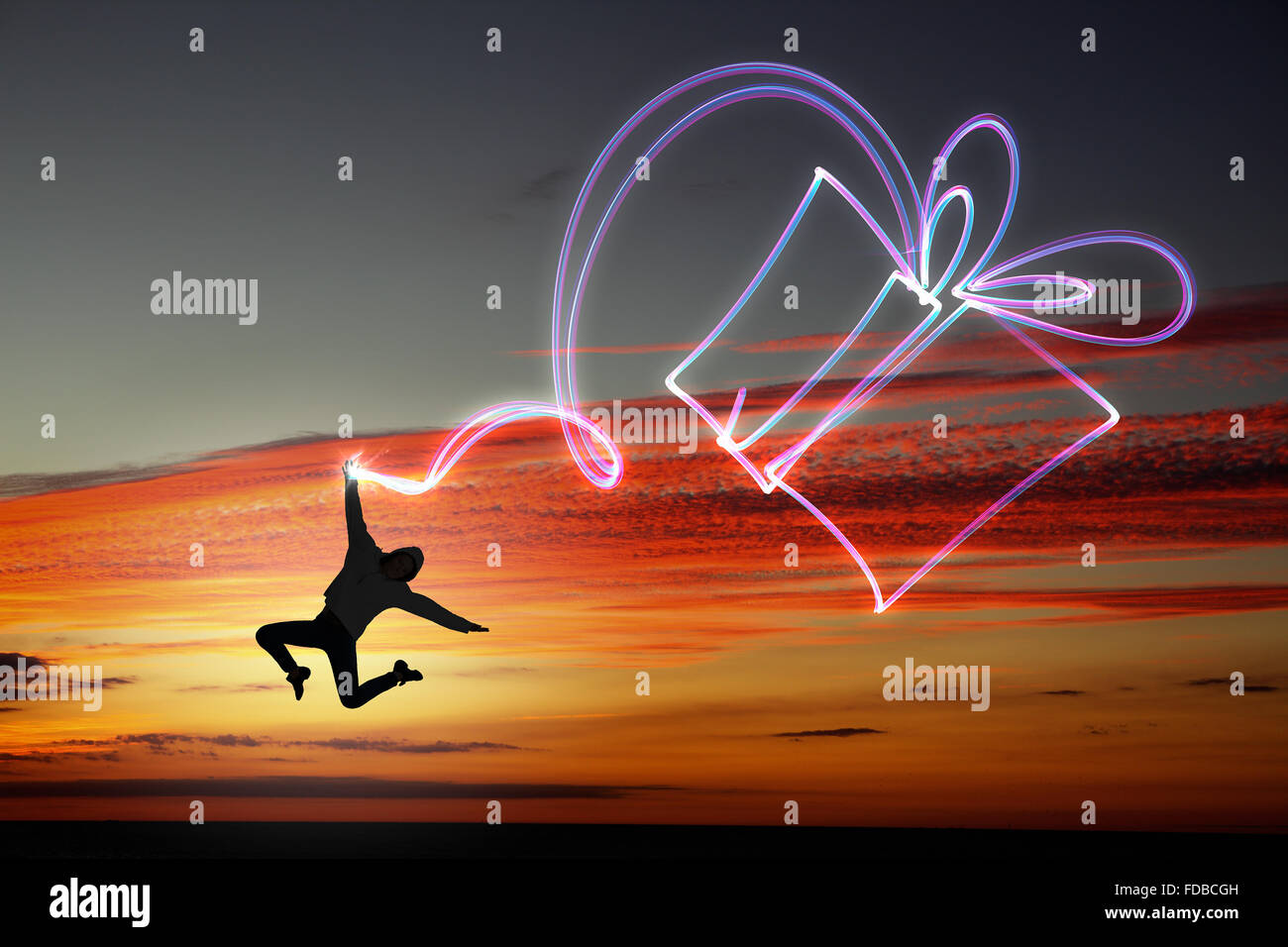 Young girl jumping high in sky representing holiday concept Stock Photo ...