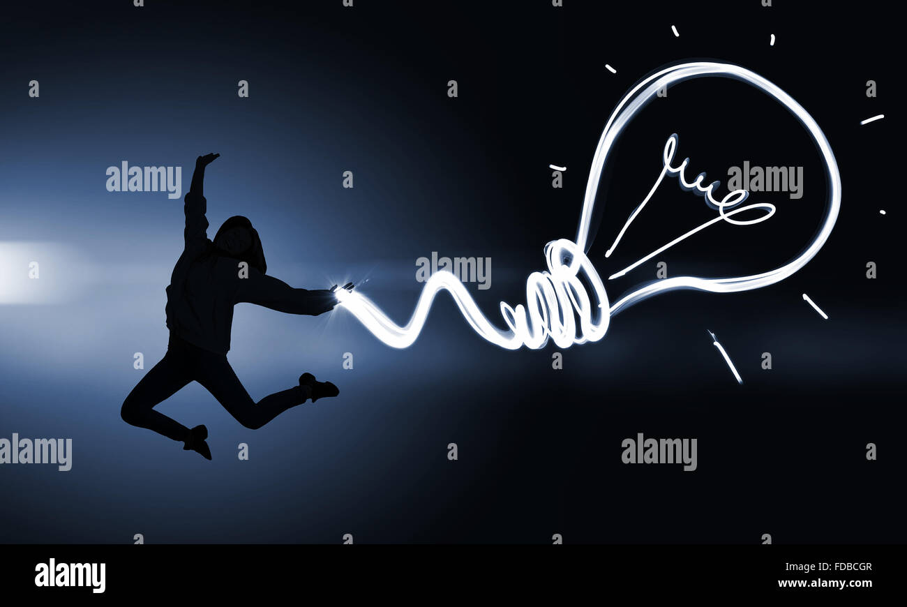 Young girl jumping high in sky and drawing idea concept Stock Photo - Alamy