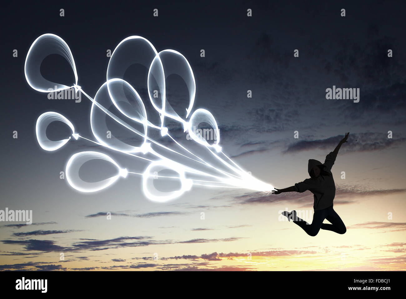 Young girl jumping high in sky representing happiness concept Stock ...