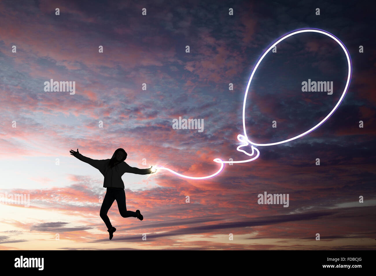 Young girl jumping high in sky representing happiness concept Stock ...