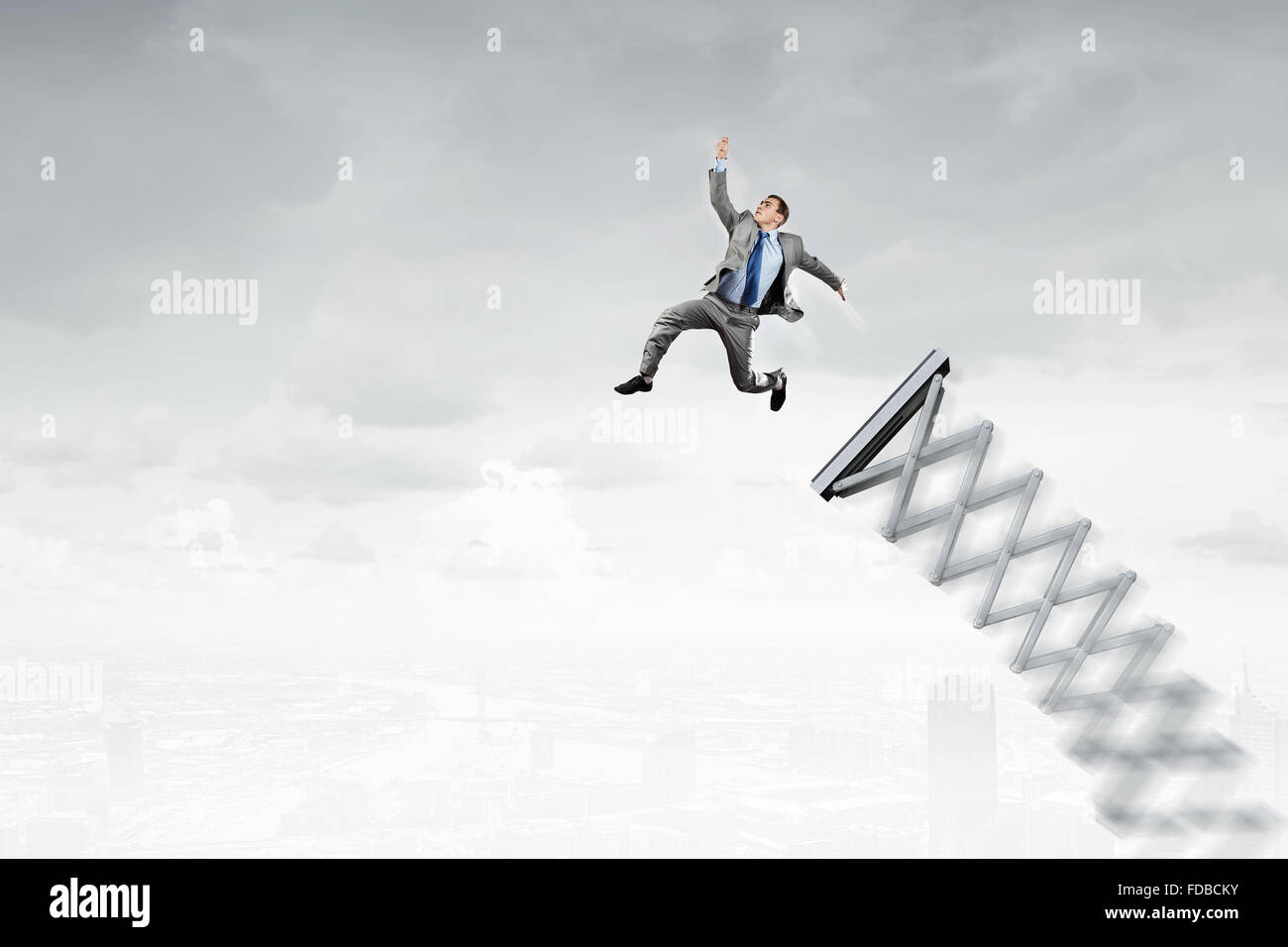 Businessman jumping on springboard as progress concept Stock Photo - Alamy