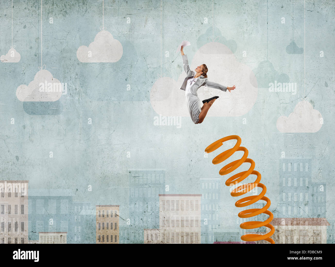 Businesswoman jumping on springboard as progress concept Stock Photo ...