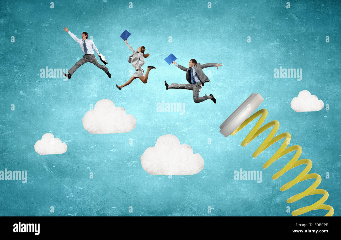 Business people jumping on springboard as progress concept Stock Photo ...