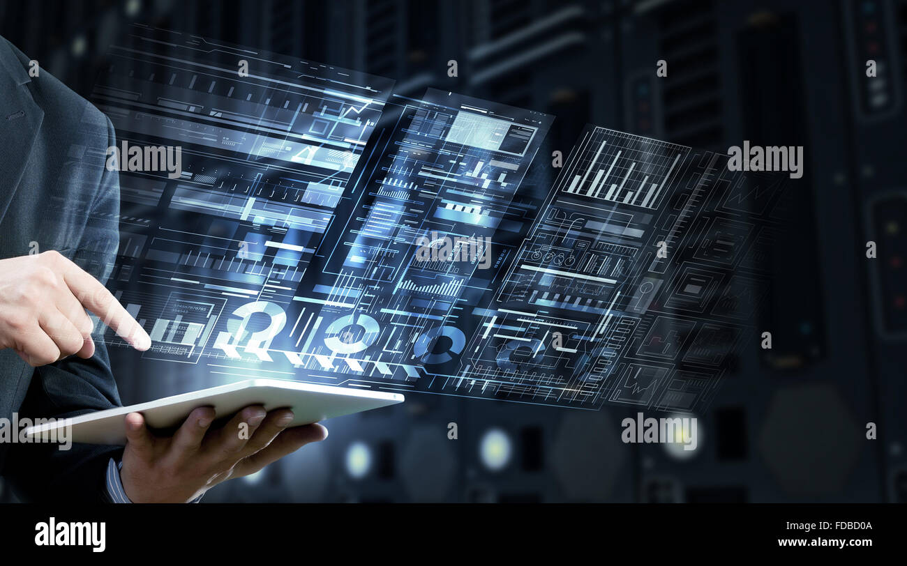 Businessman using tablet over virtual interface background Stock Photo ...