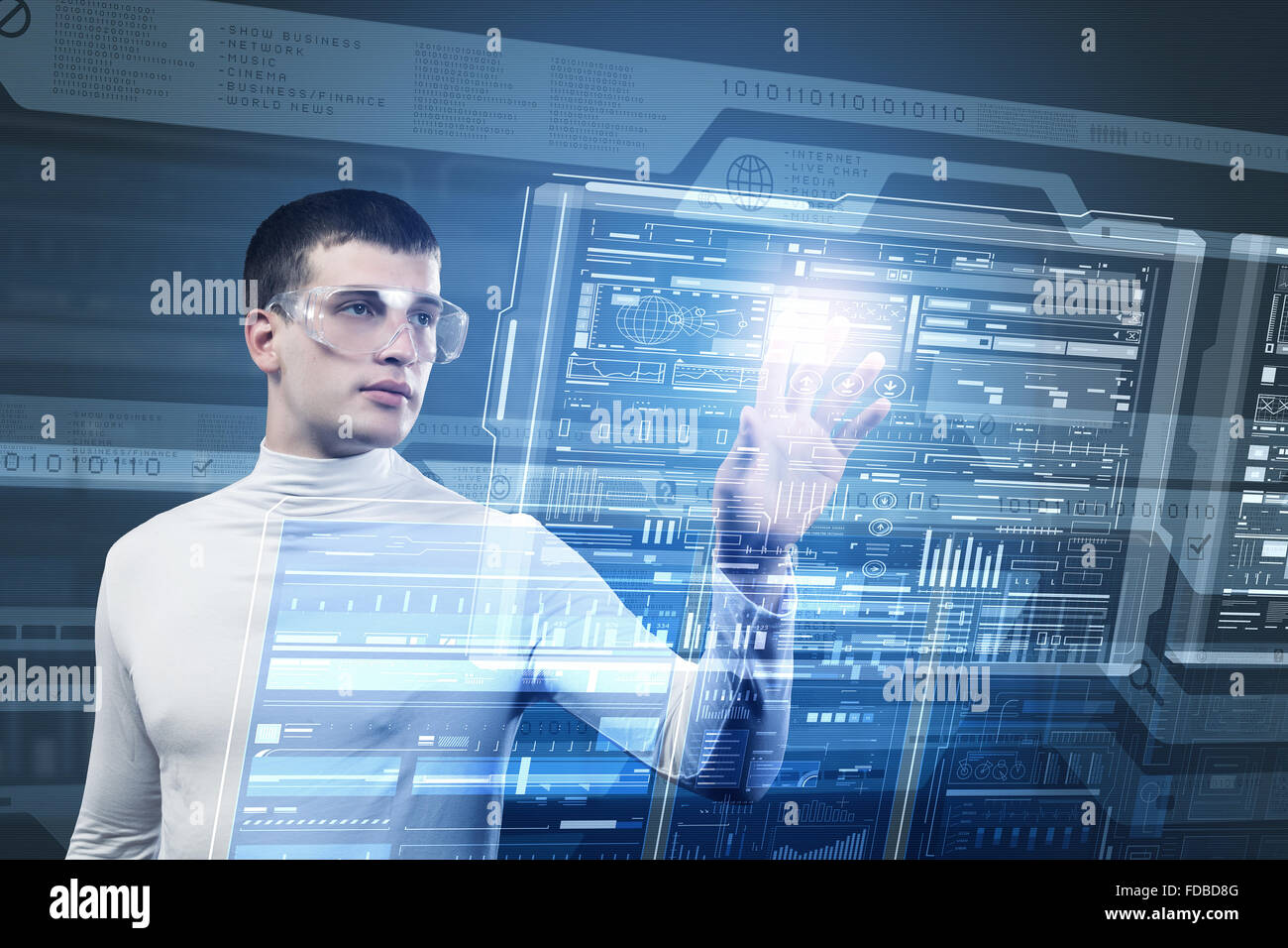 Young man pushing with finger icon on virtual screen Stock Photo - Alamy