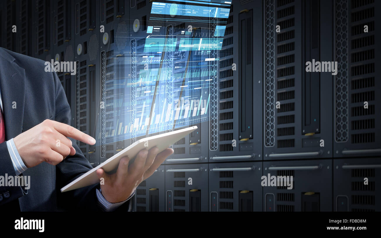 Businessman using tablet over virtual interface background Stock Photo ...