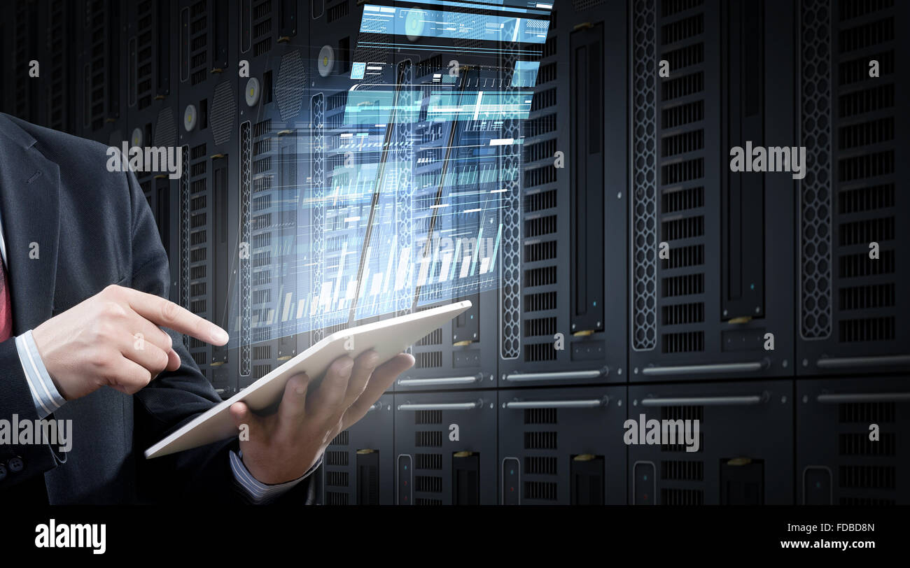 Businessman using tablet over virtual interface background hi-res stock ...