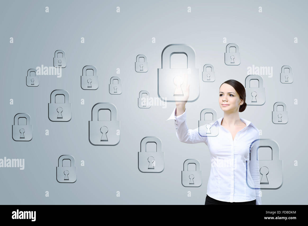 Attractive businesswoman touching with finger media lock icon Stock ...