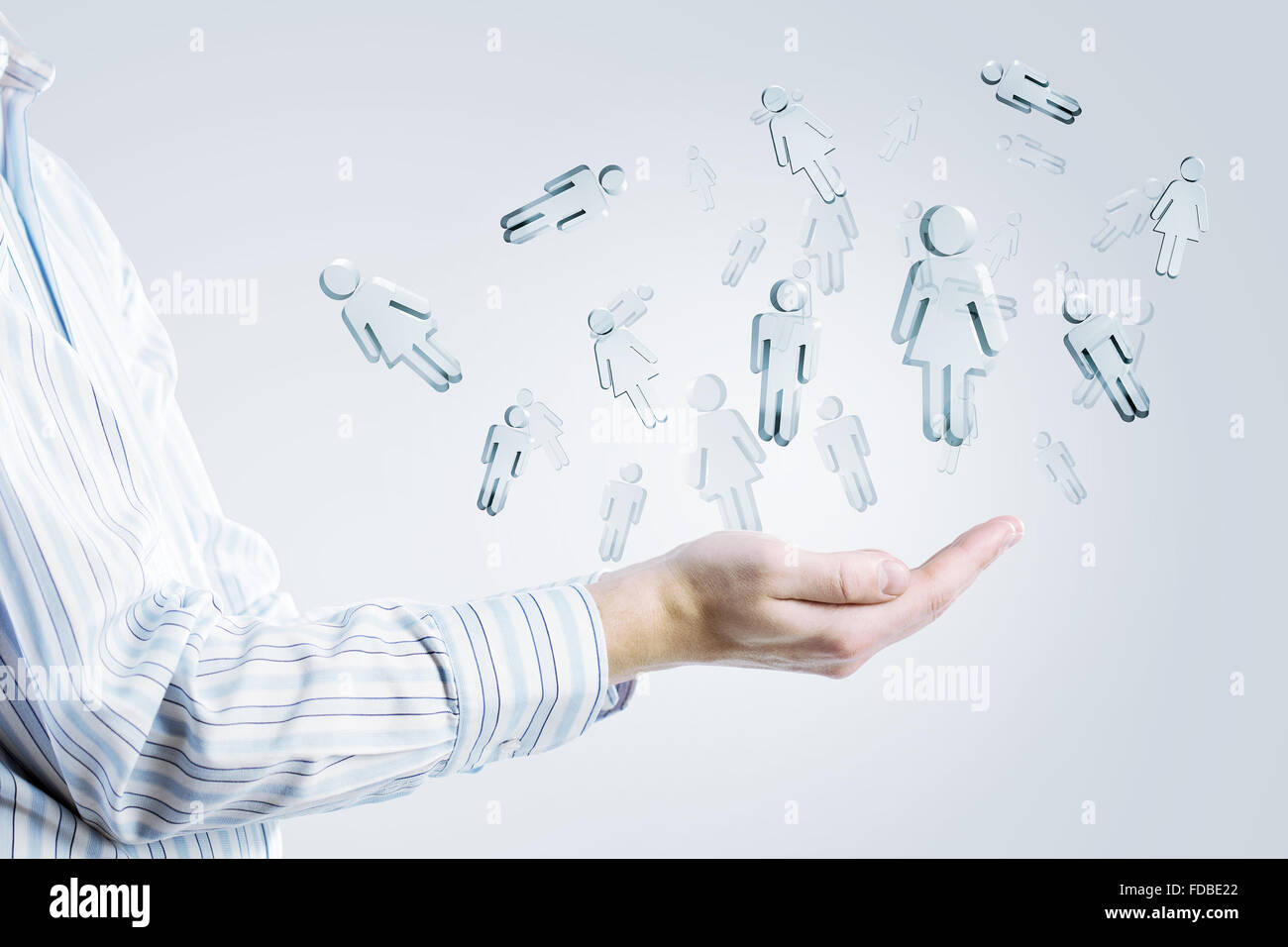 Businessman holding modern social buttons in palm Stock Photo - Alamy