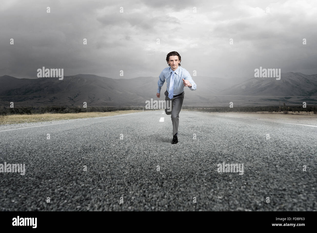 Young guy running on asphalt hi-res stock photography and images - Alamy