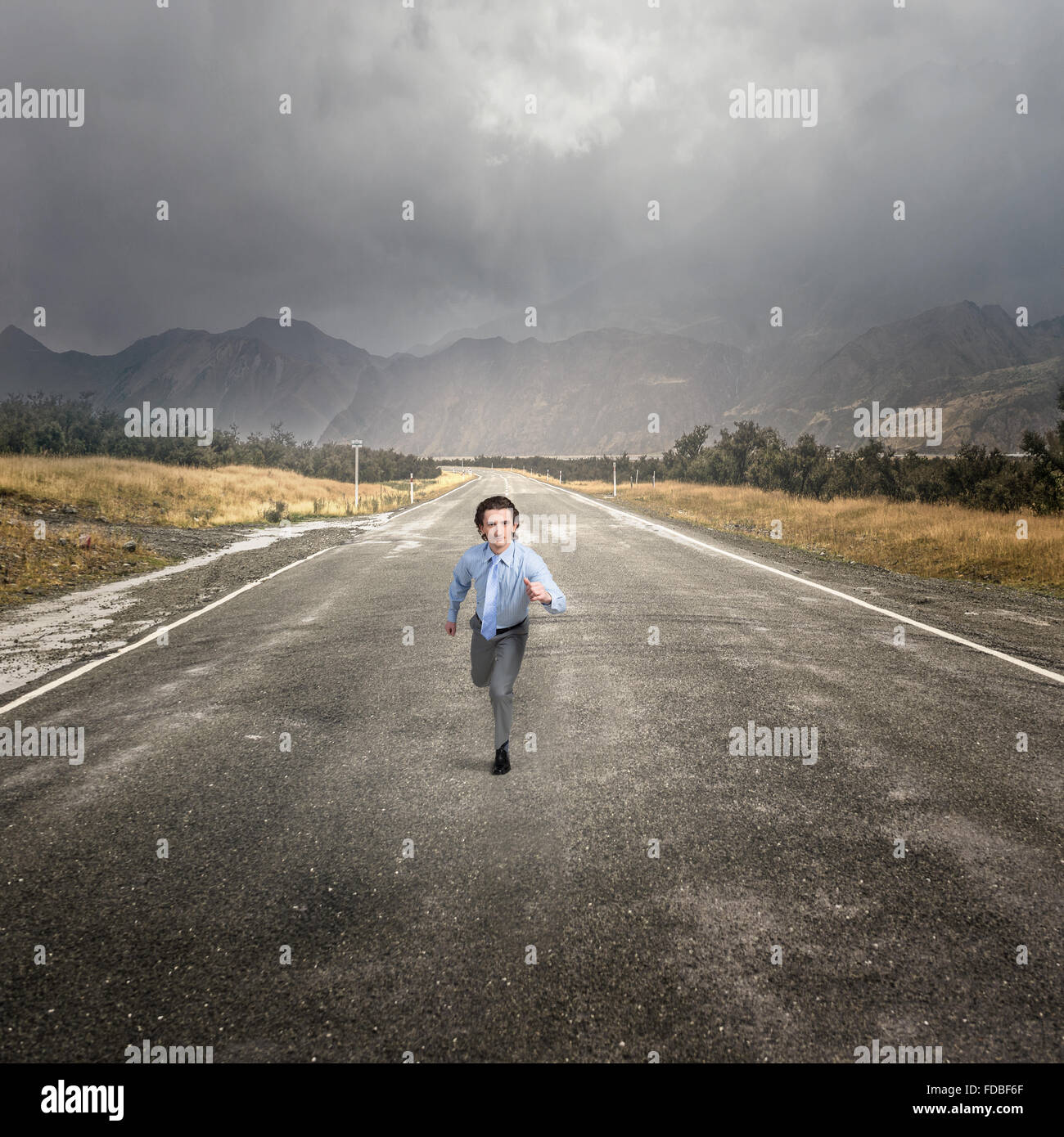 Young guy running on asphalt hi-res stock photography and images - Alamy