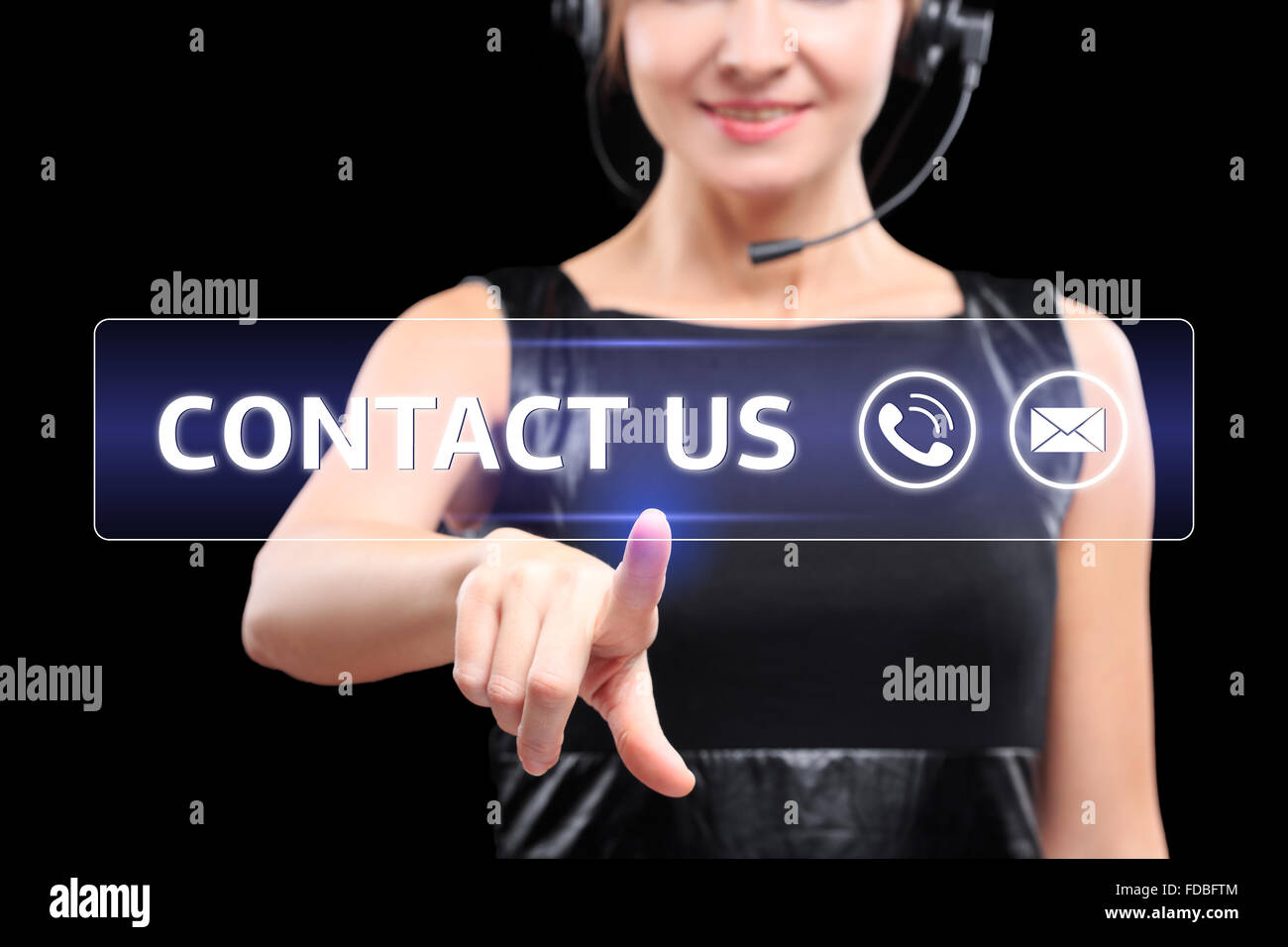 business woman presses a button on the touch screen. contact us Stock ...