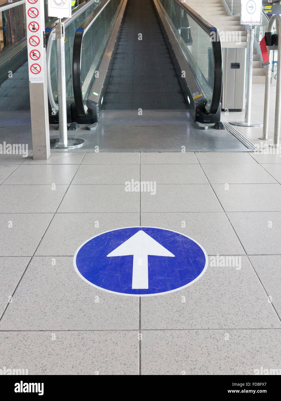 White directional arrow sign, Italy Stock Photo - Alamy