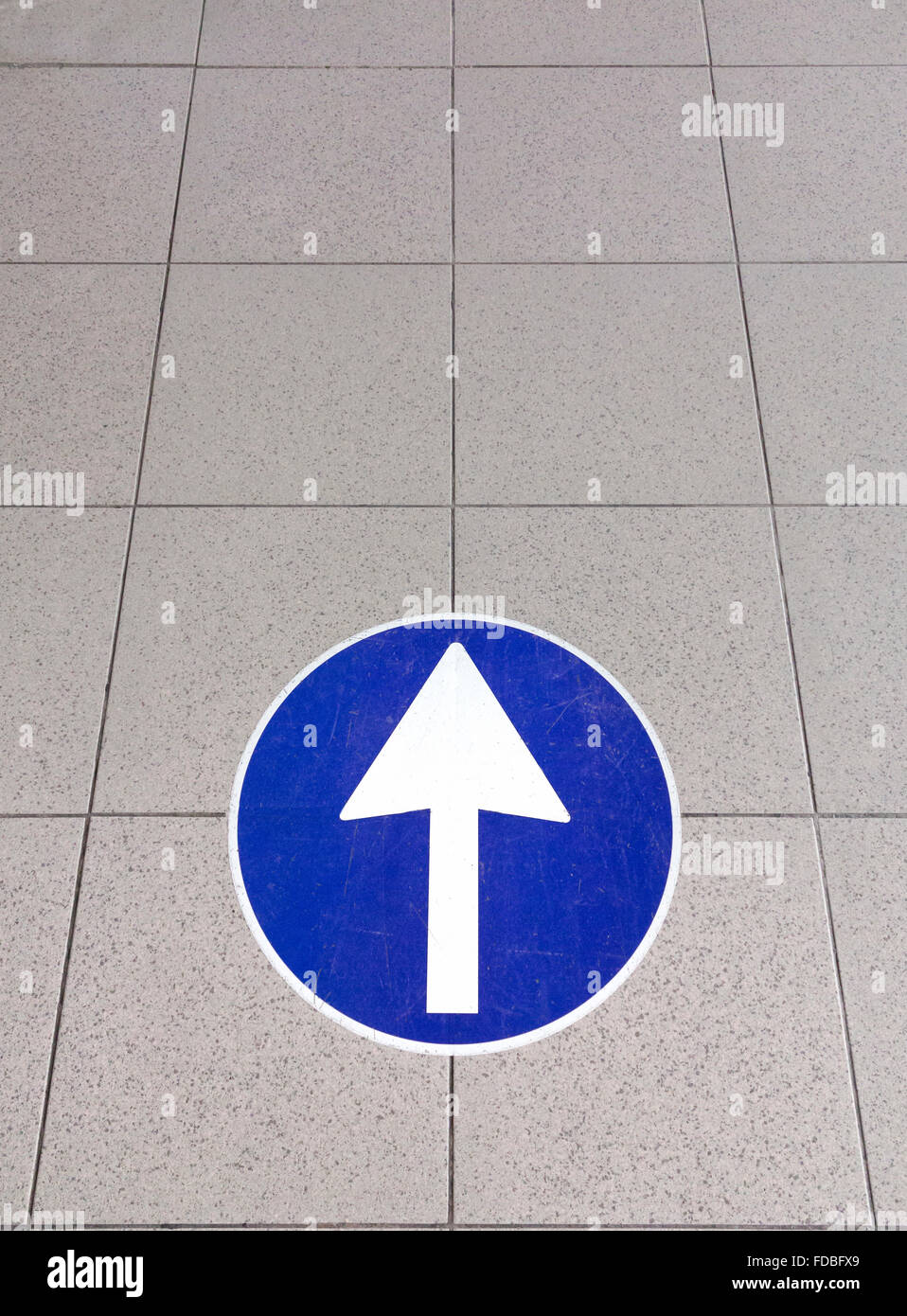 White directional arrow sign, Italy Stock Photo - Alamy