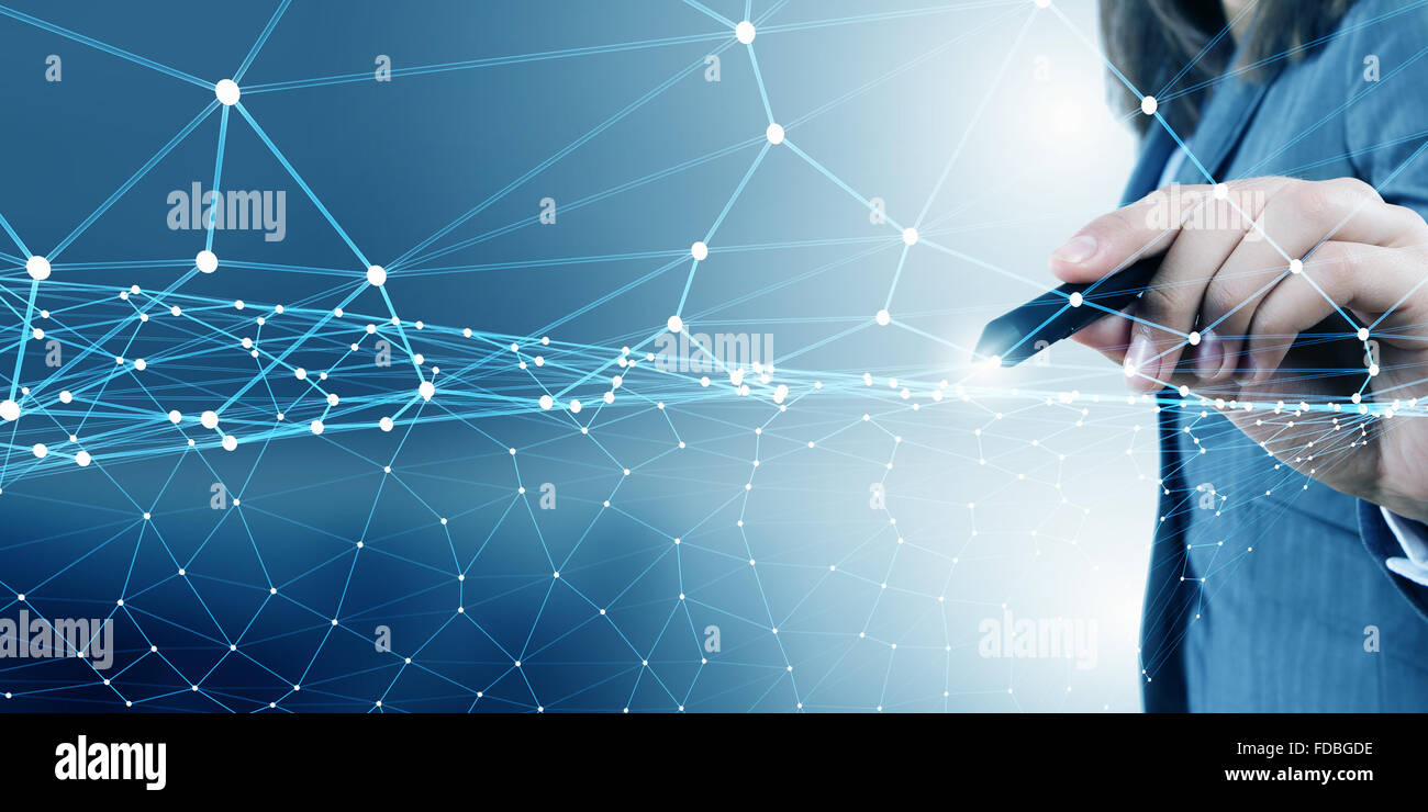 Businesswoman hand drawing digital connection lines on virtual screen ...