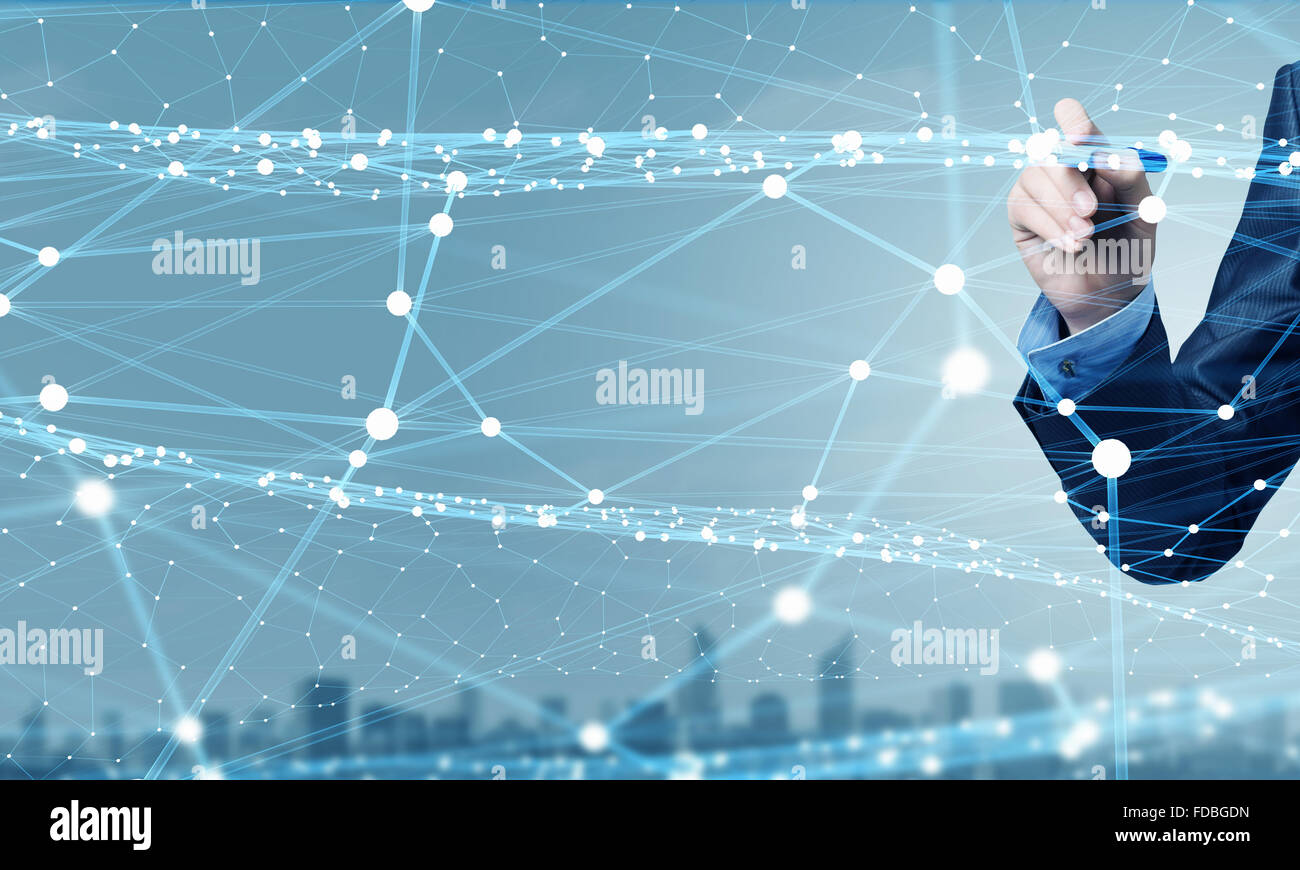 Businessman hand drawing digital connection lines on virtual screen ...