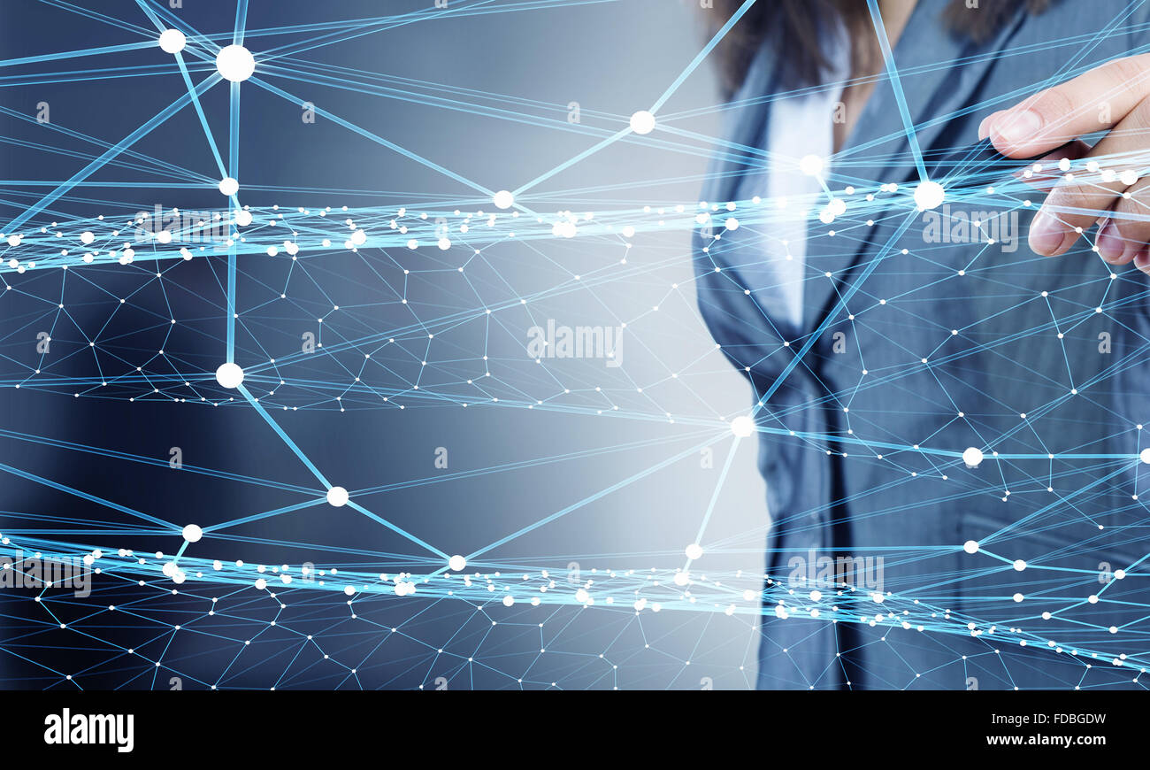 Businesswoman hand drawing digital connection lines on virtual screen ...