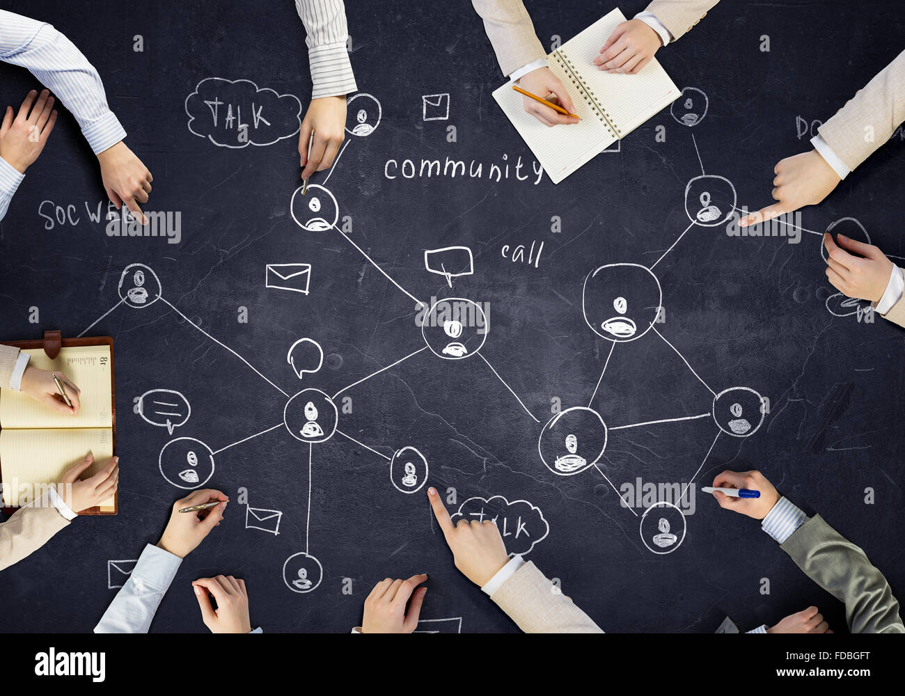 Top view of people hands drawing networking strategy Stock Photo - Alamy