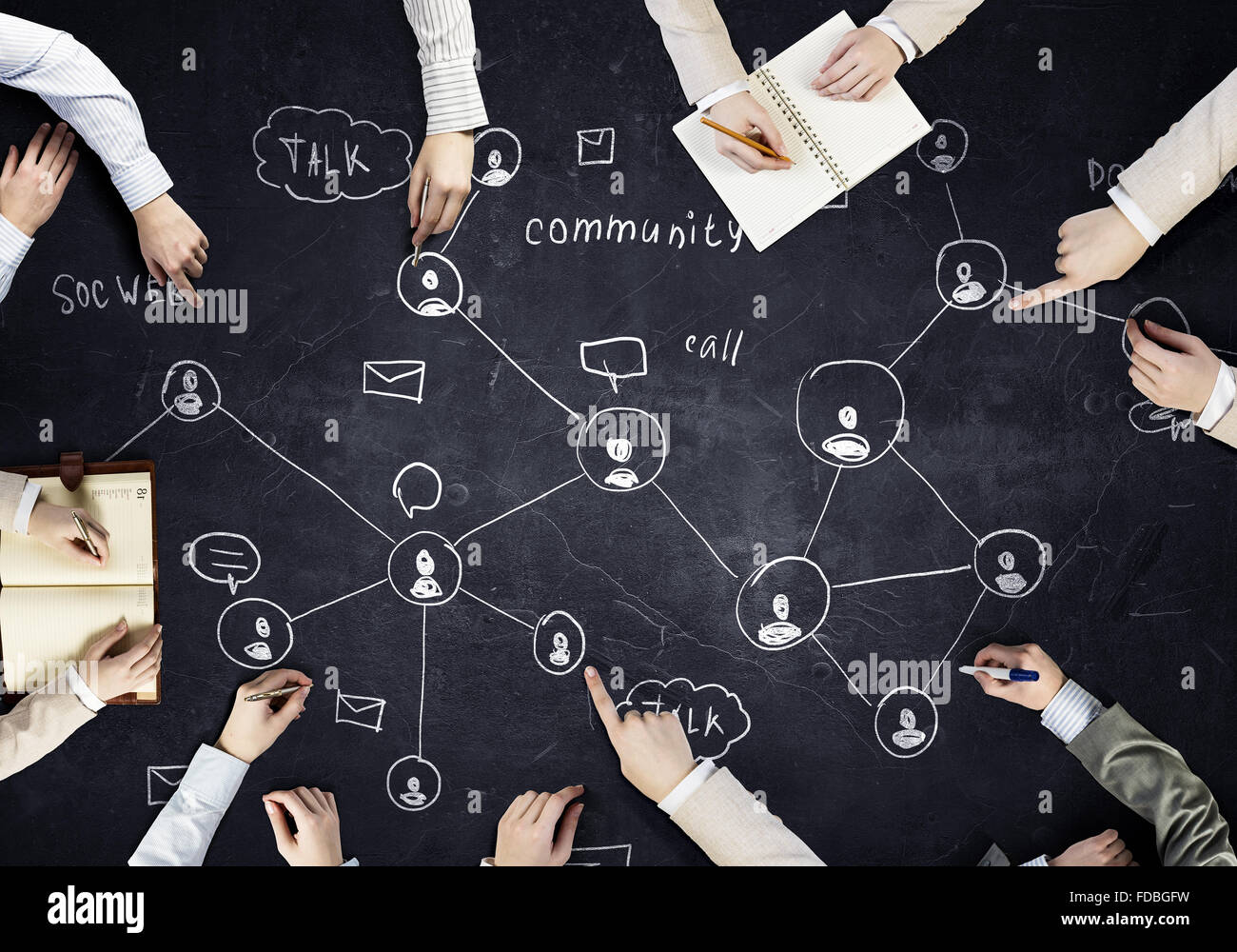 Top view of people hands drawing networking strategy Stock Photo - Alamy